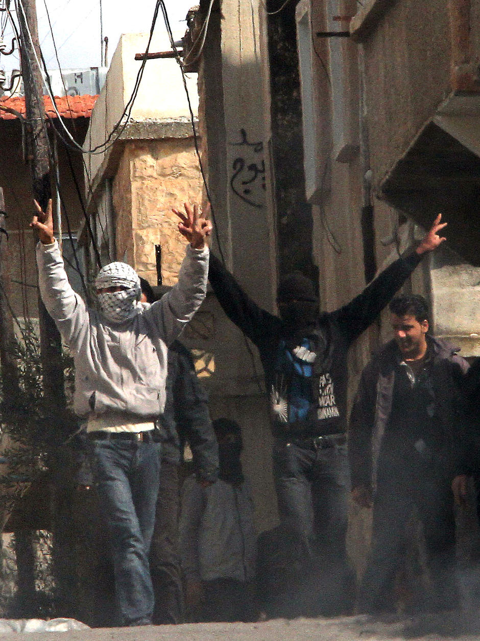 10 dead in rare Syrian protest - ABC News