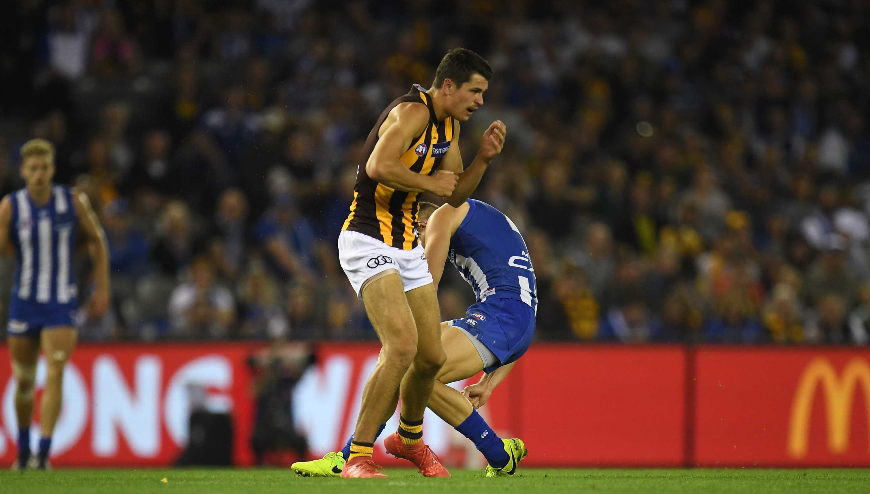 AFL fine for Hawthorn's Ryan Burton divides opinion after his bump ...