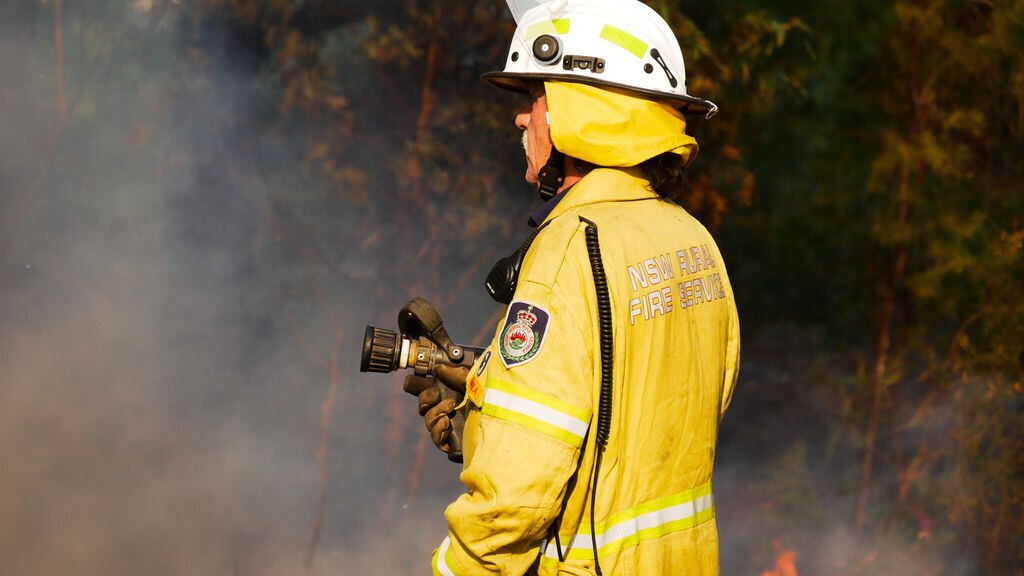 A hazard reduction burn being carried out by the RFS. - ABC News