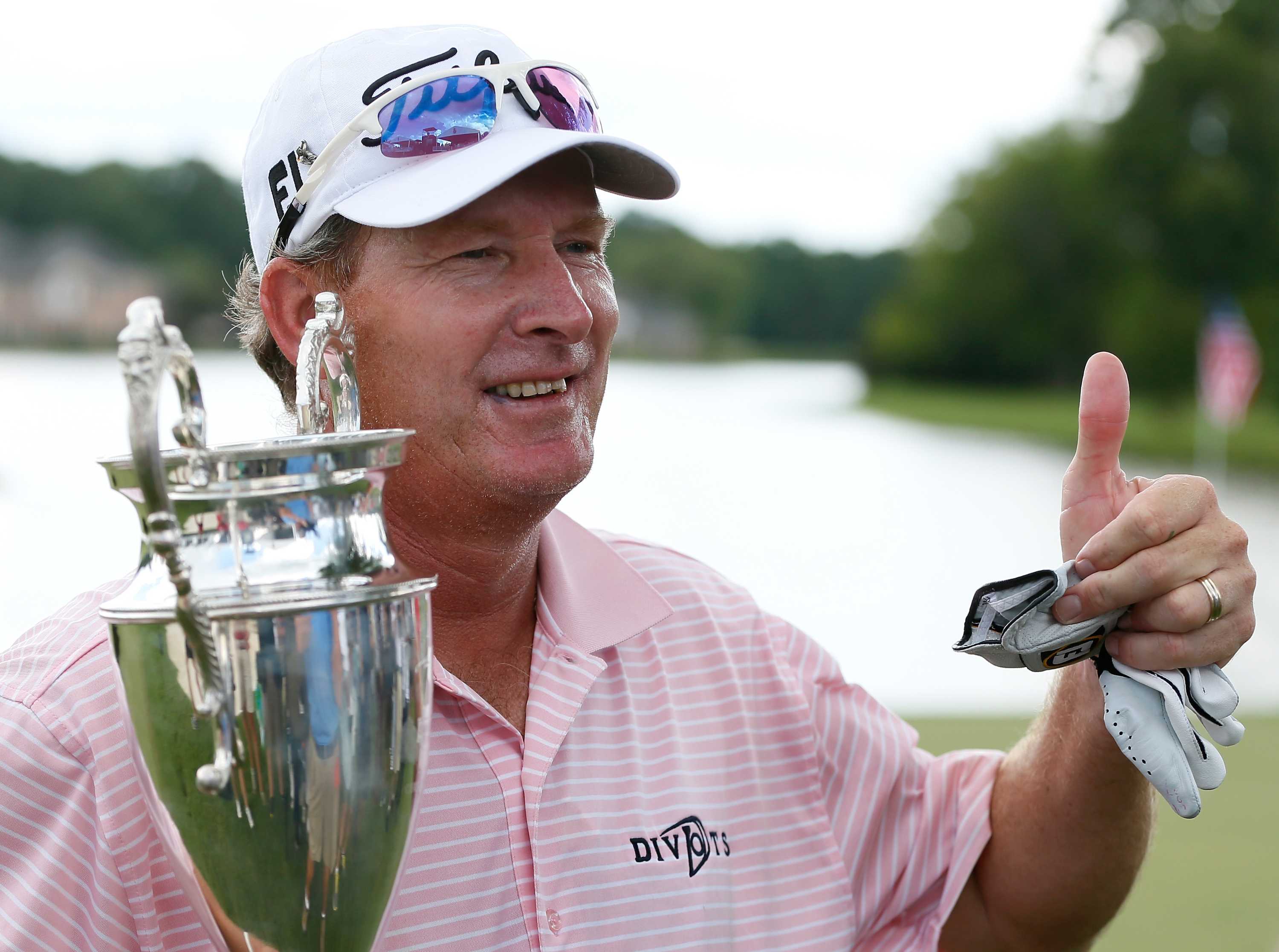 Golf: Playoff birdie gives Woody Austin first win since 2007 - ABC News