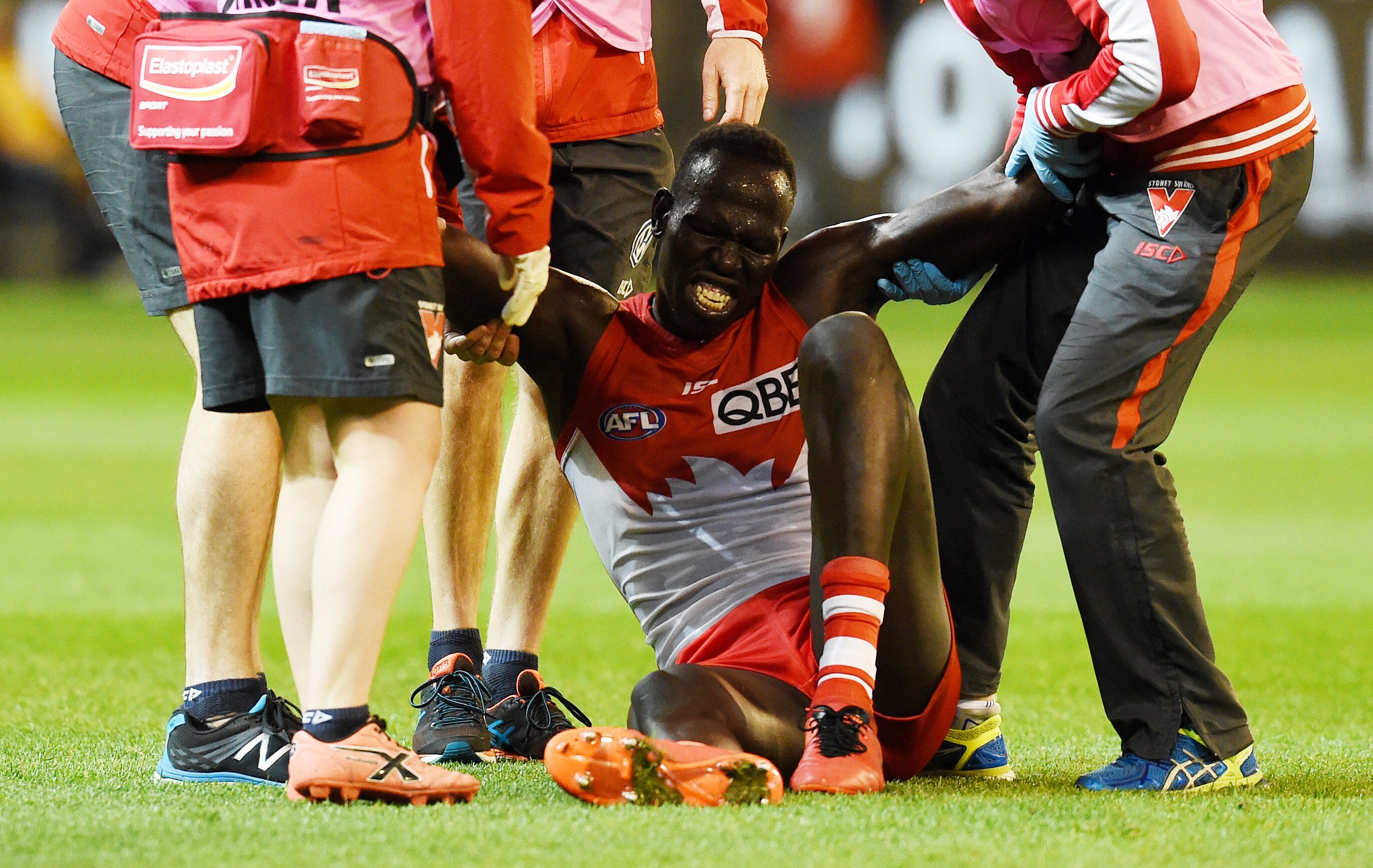 AFL doctor reveals tricks of the trade to keep bloodied footballers in ...