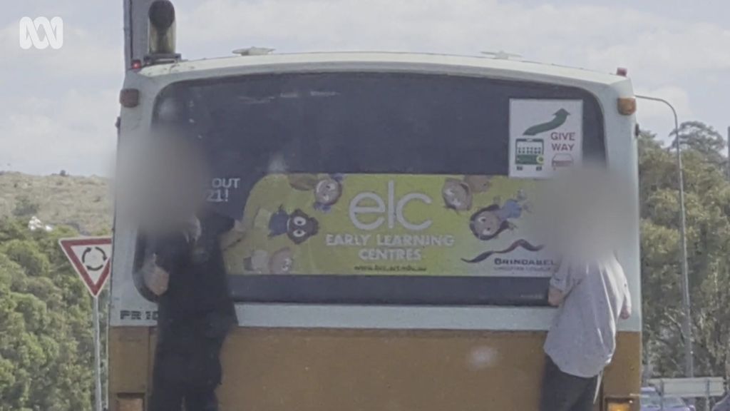 Children filmed hanging onto back of moving bus in Canberra - ABC News