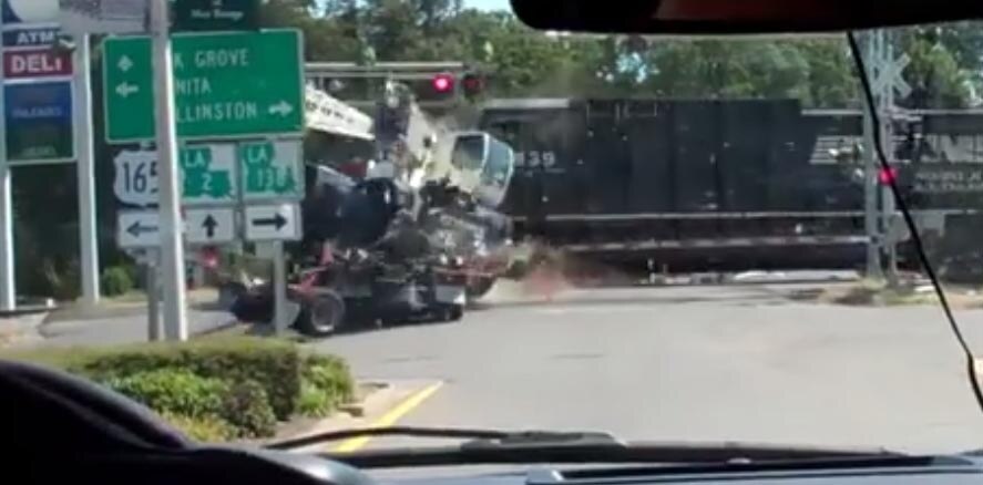 Train filmed smashing into stricken truck and derailing in Mer Rouge ...