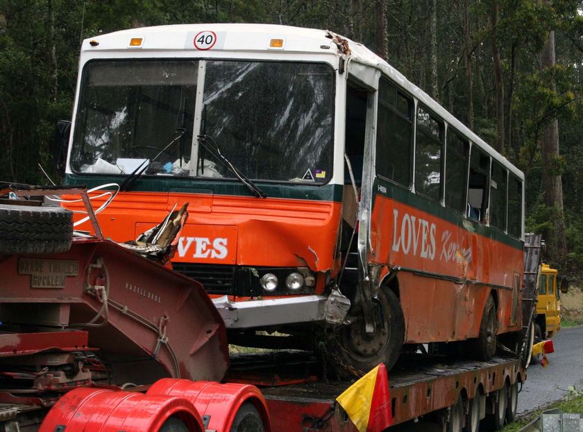 Driver injured after bus runs off road - ABC News