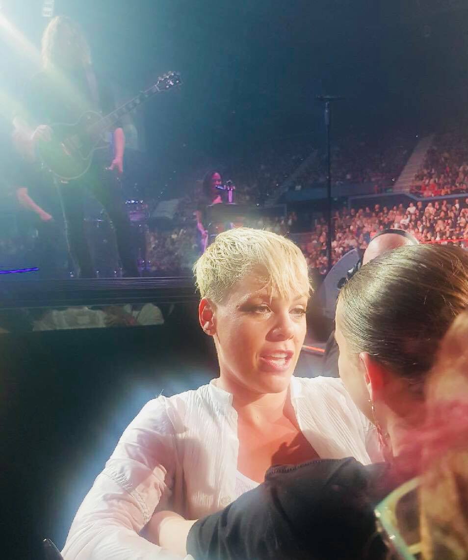 Pink answers grieving girl's wish for a hug at Brisbane concert - ABC News