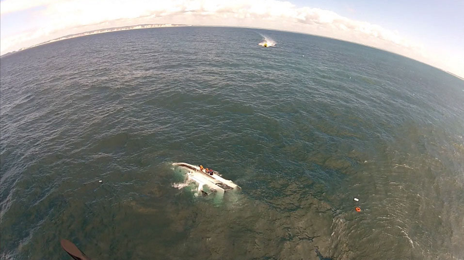 Trio rescued after boat capsizes - ABC News