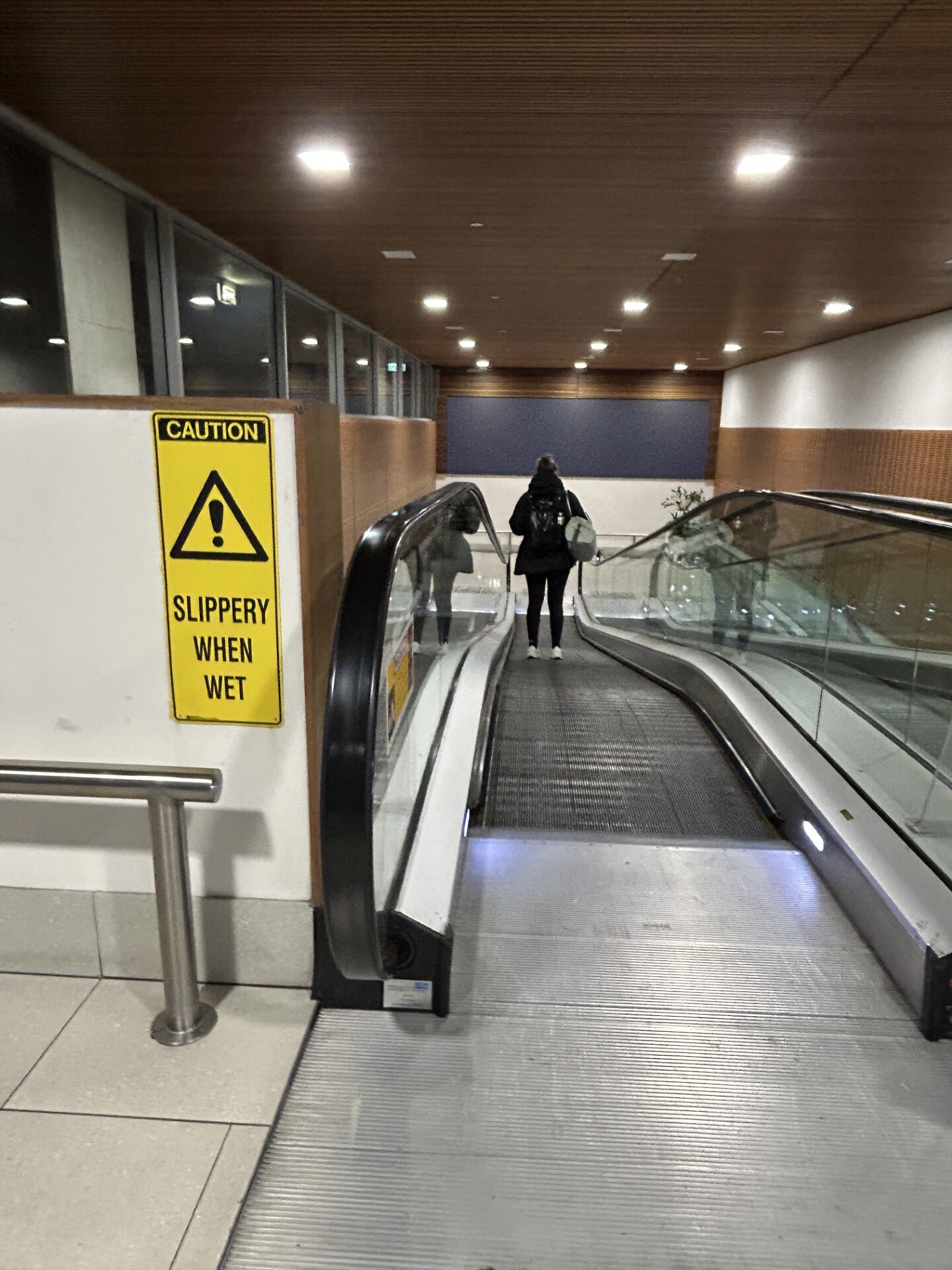Shoppers claim this Glenelg travelator is more like a slip 'n slide ...