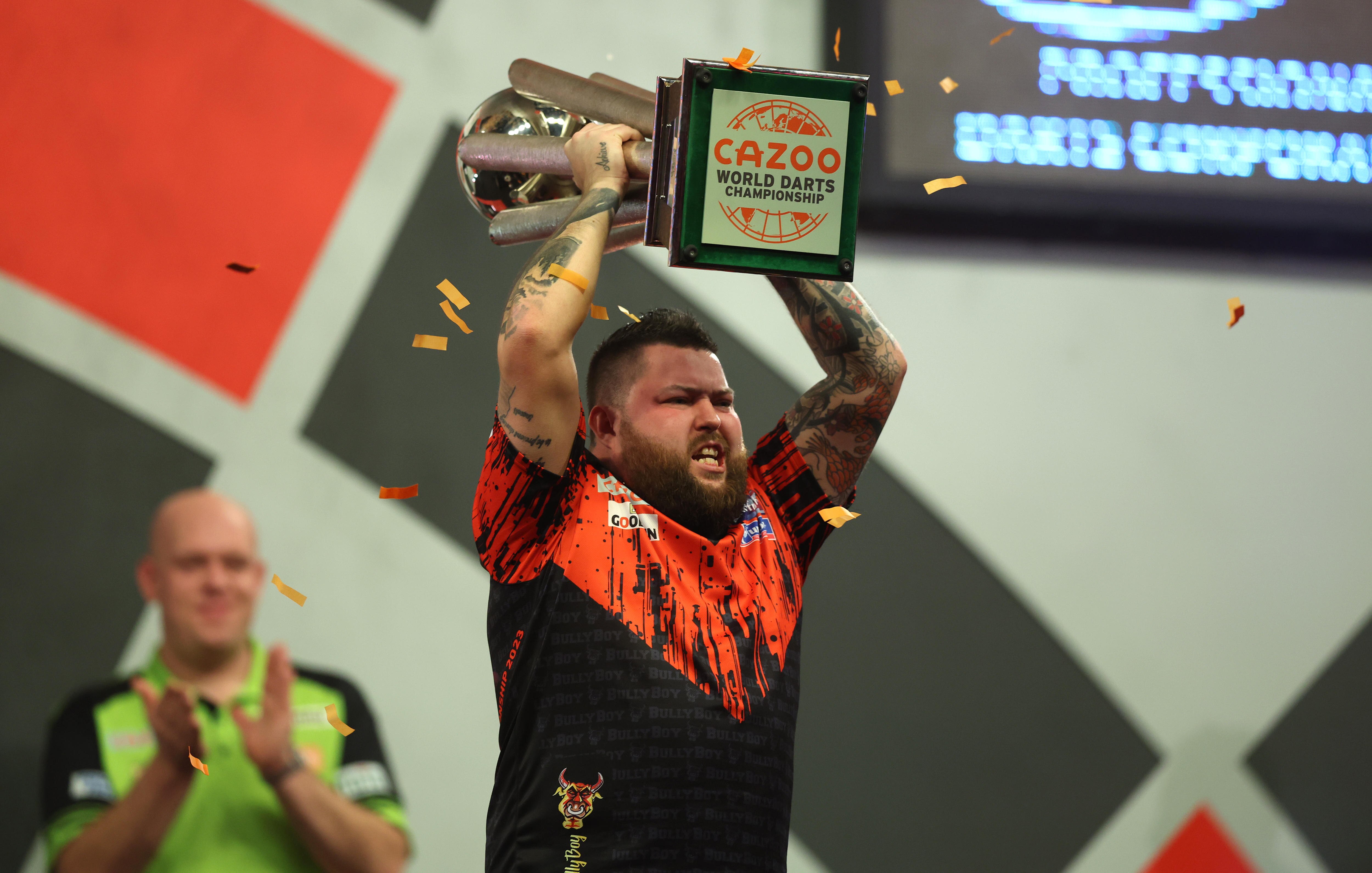 England's Michael Smith hits a nine-dart finish on the way to the PDC ...