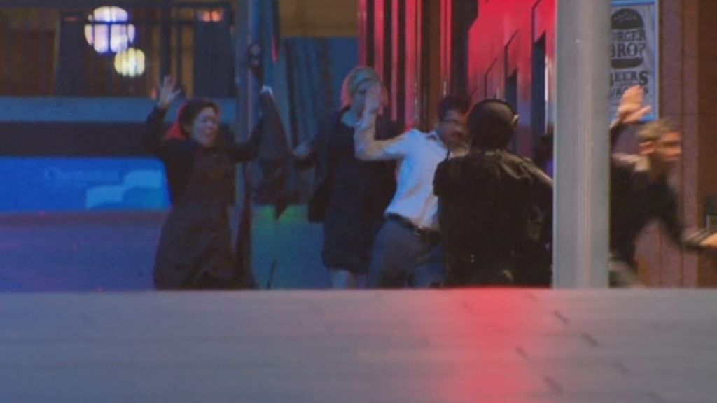Sydney siege: Two hostages and gunman dead after heavily armed police ...