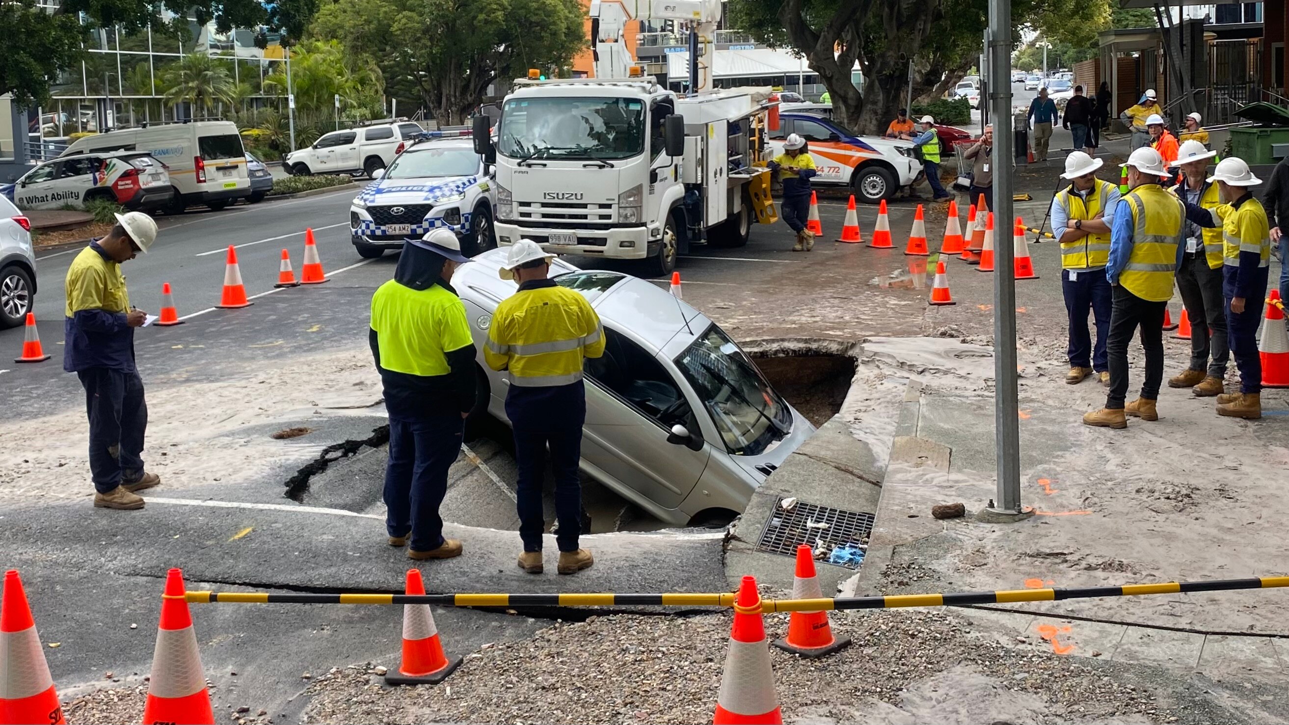 Short Street closes after sinkhole swallows car at Southport on the ...