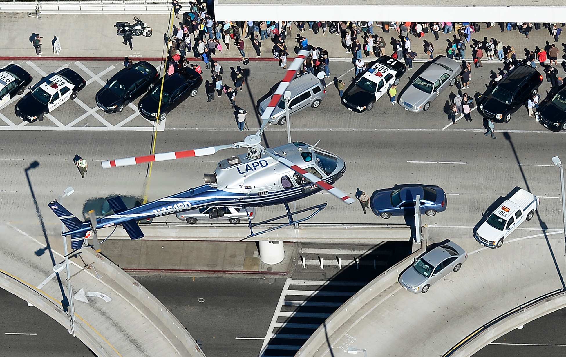 Shooter kills security officer, wounds several at Los Angeles ...