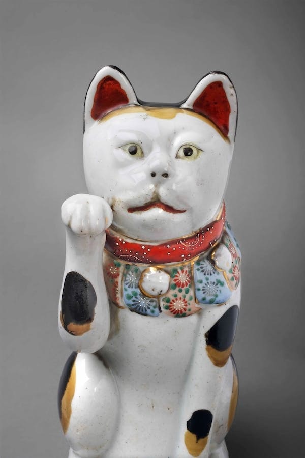 What is the story of maneki-neko, the Japanese beckoning cat? - ABC News