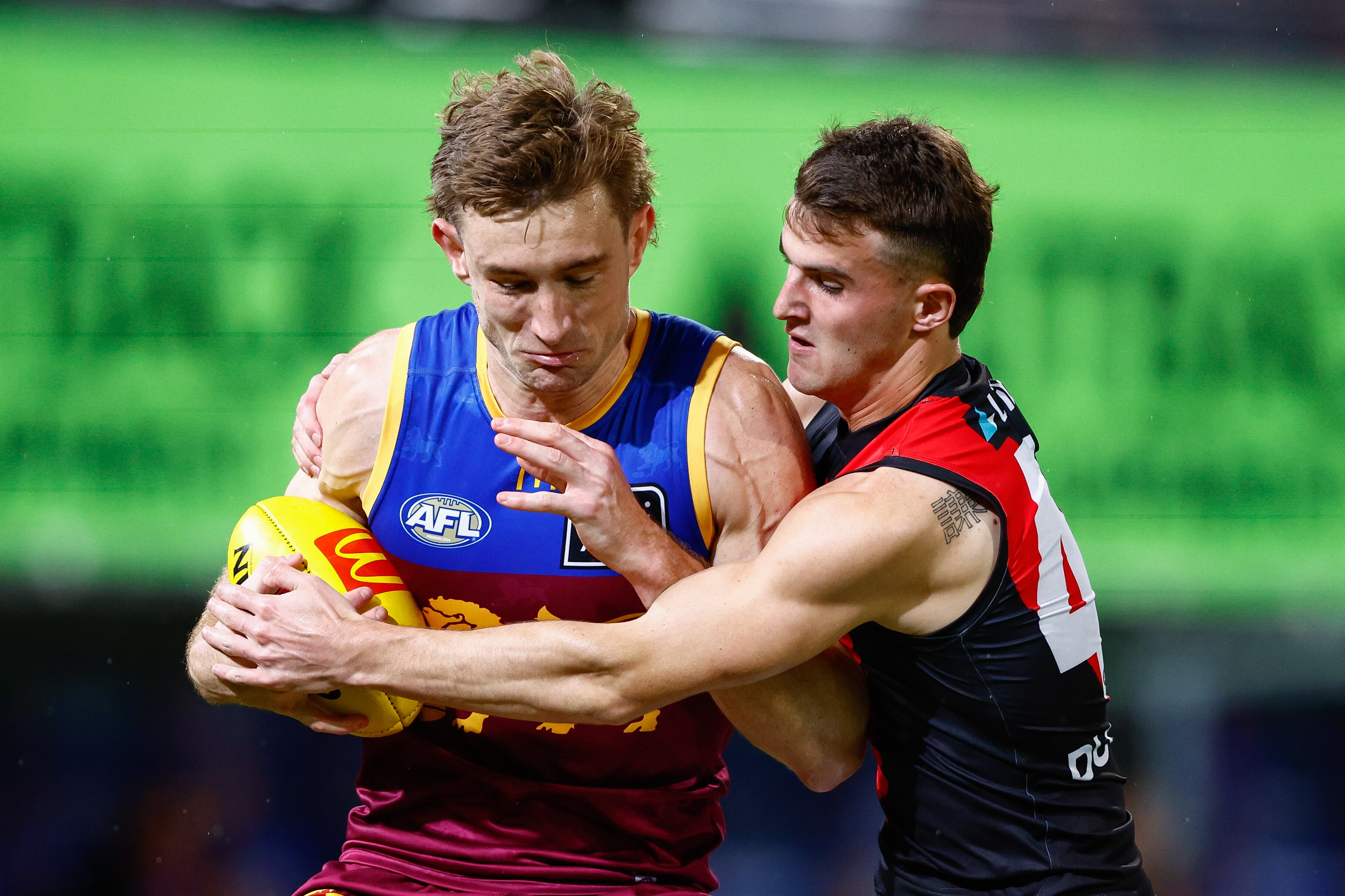 Brisbane holds off Essendon comeback to win by 18 as young Bombers gun ...
