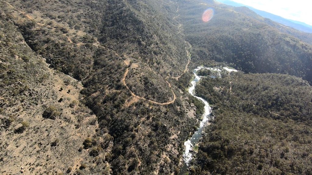 Aerial inspection of Snowy Mountain fire trails. - ABC News