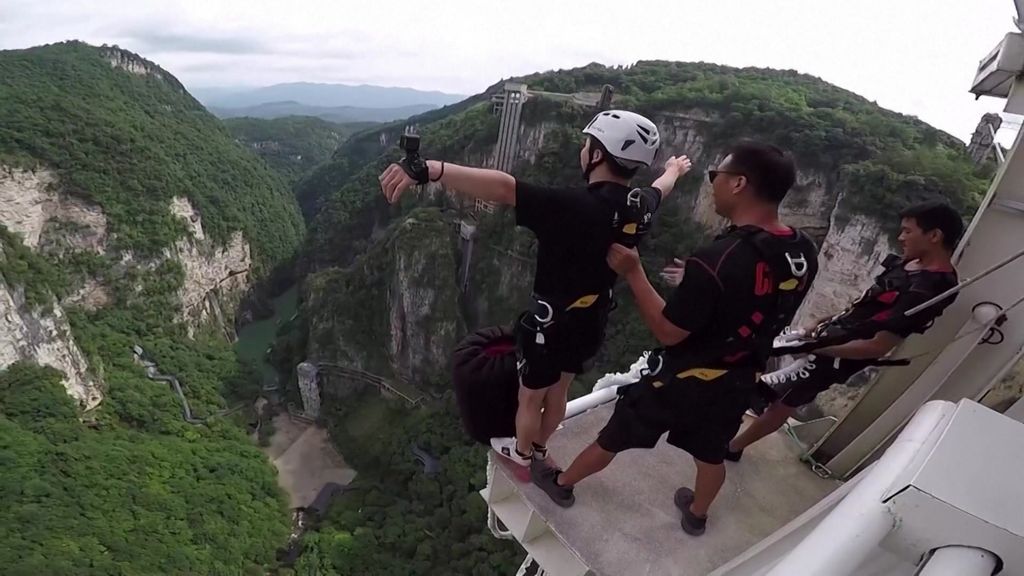 Bungy jump from the world's highest glass-bottom bridge in China - ABC News