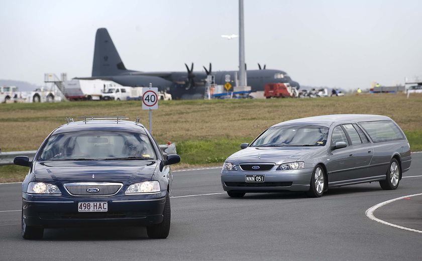 PNG crash bodies arrive in Brisbane - ABC News