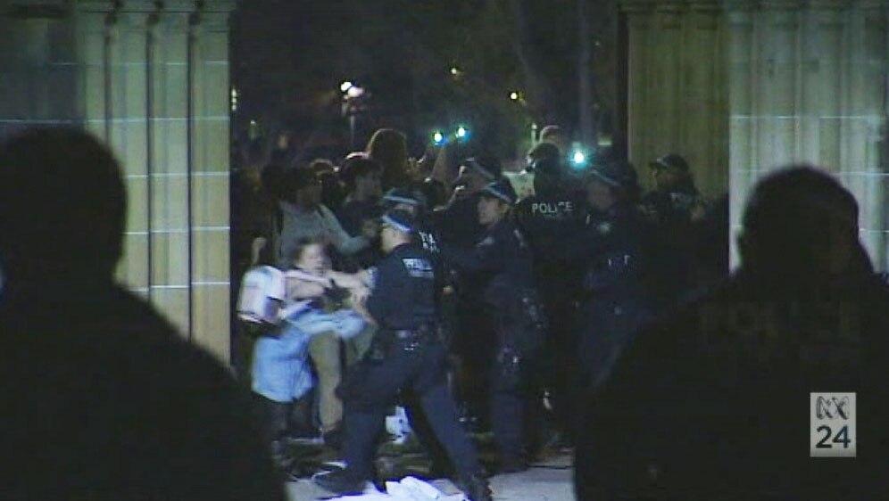 Student protests: Police clash with demonstrators at Liberal Party ...