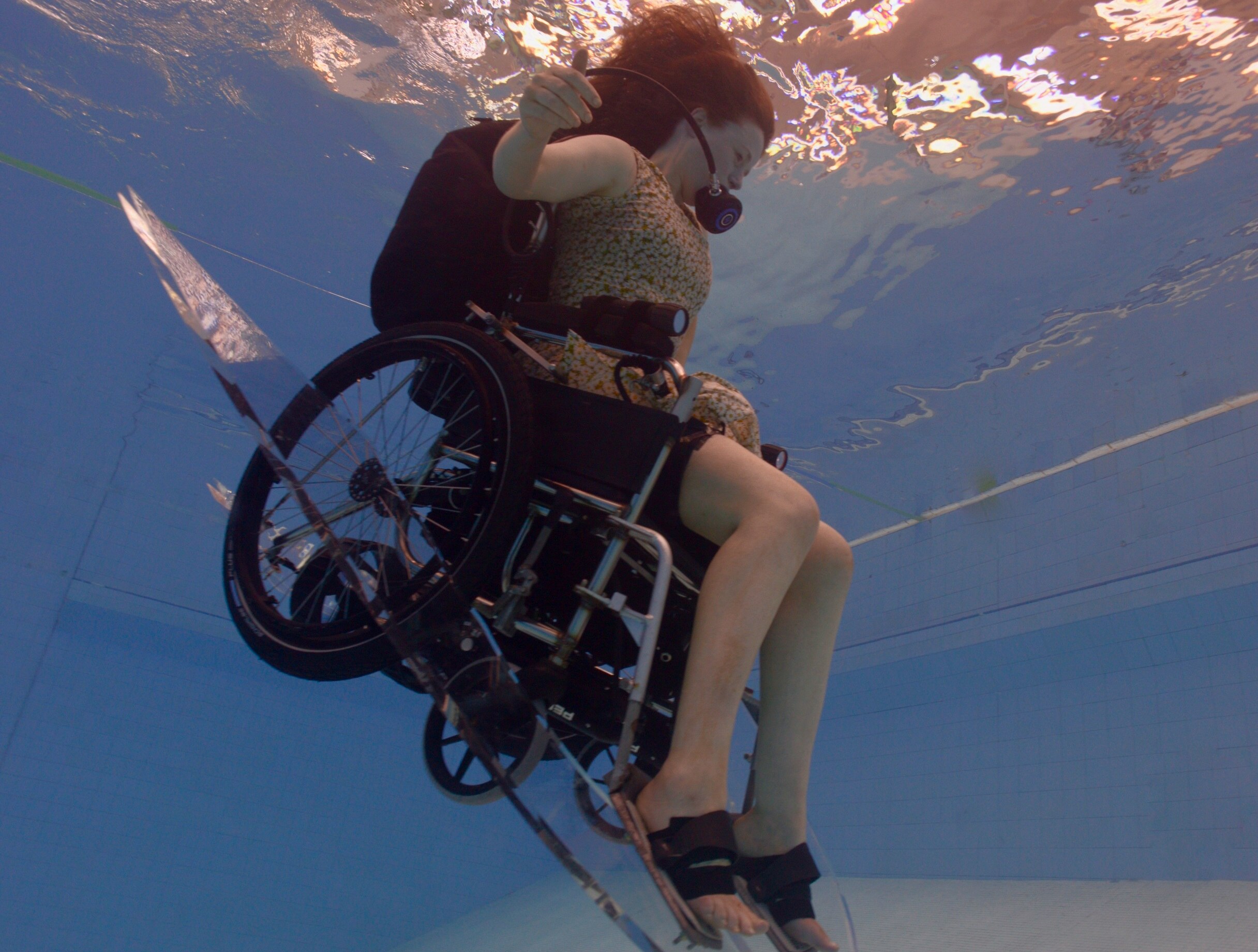 Sue Austin smashes wheelchair stereotypes though art - ABC listen
