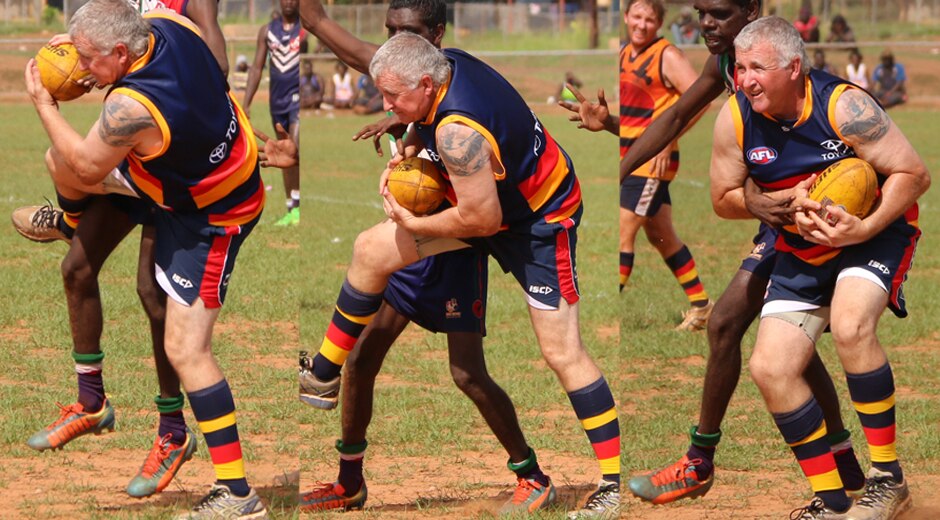 Local police officer kicking goals in effort to keep the peace at ...