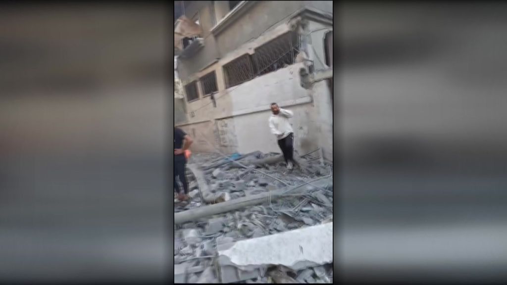 Gazan resident walks through rubble of destroyed building - ABC News