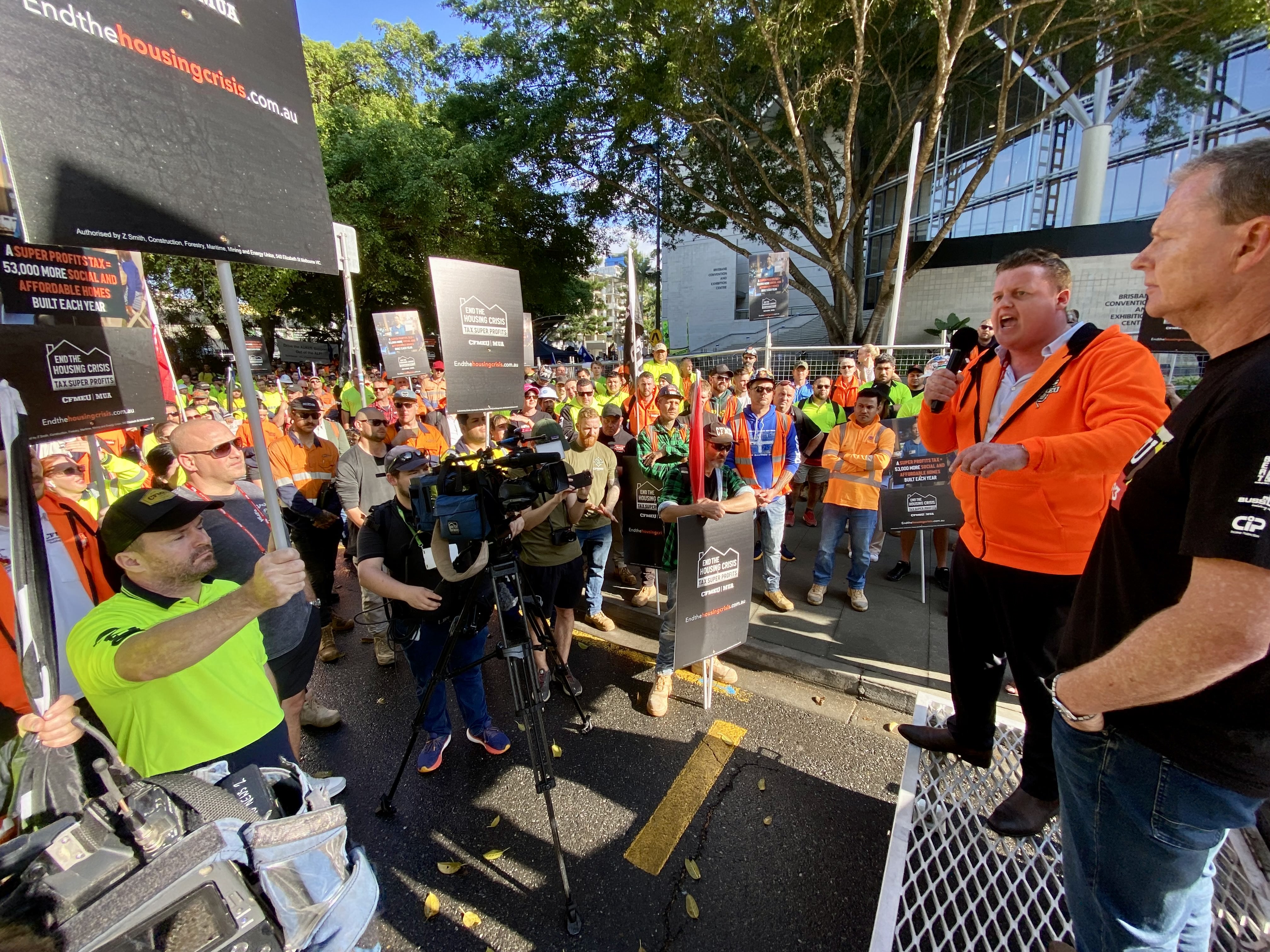 Thousands of environmental and union protesters gather in Brisbane as ...