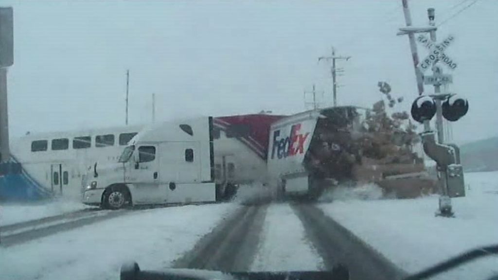 Dash-cam video captures passenger train smashing into FedEx semi ...