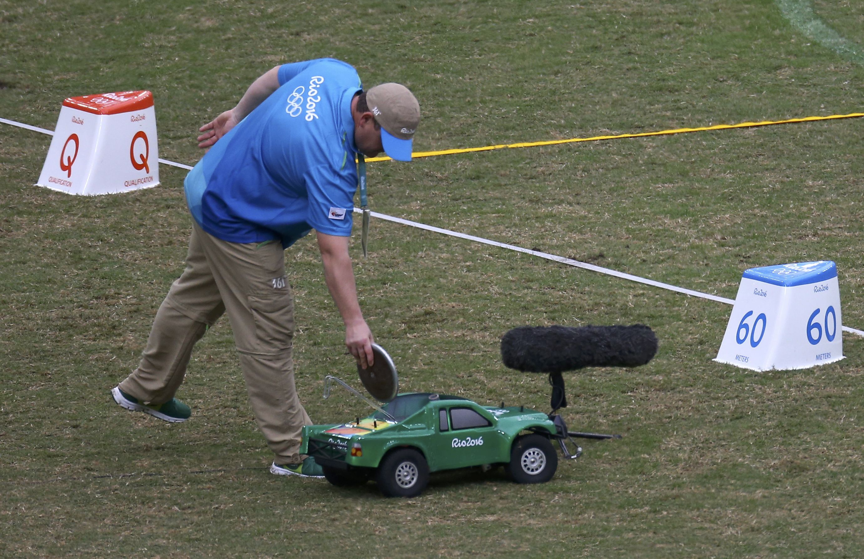 What are the little remote controlled cars on the field at the Olympics ...
