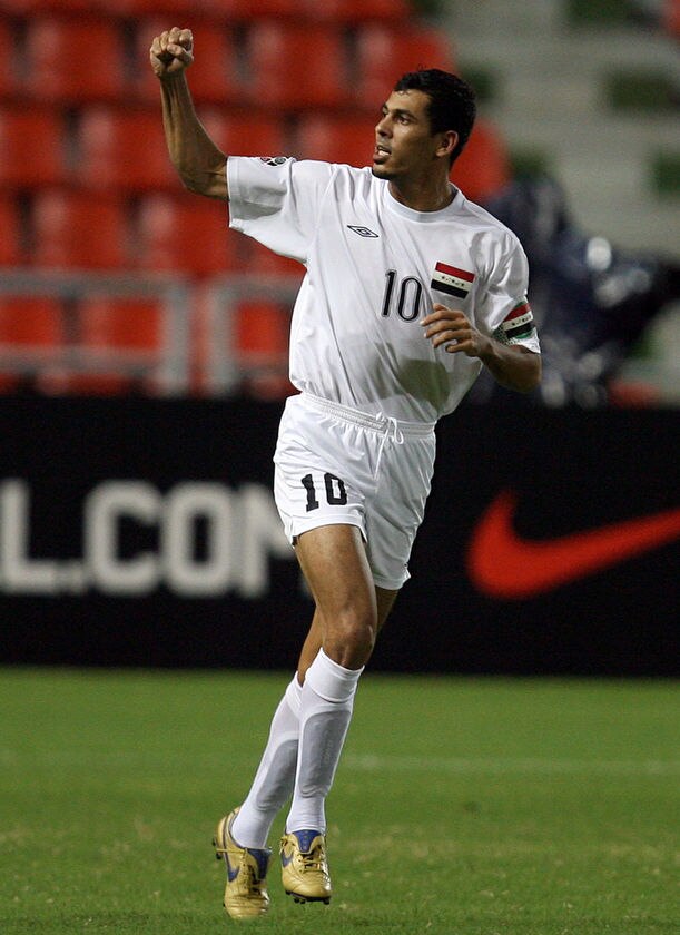 Mahmoud double sends Iraq into semis - ABC News