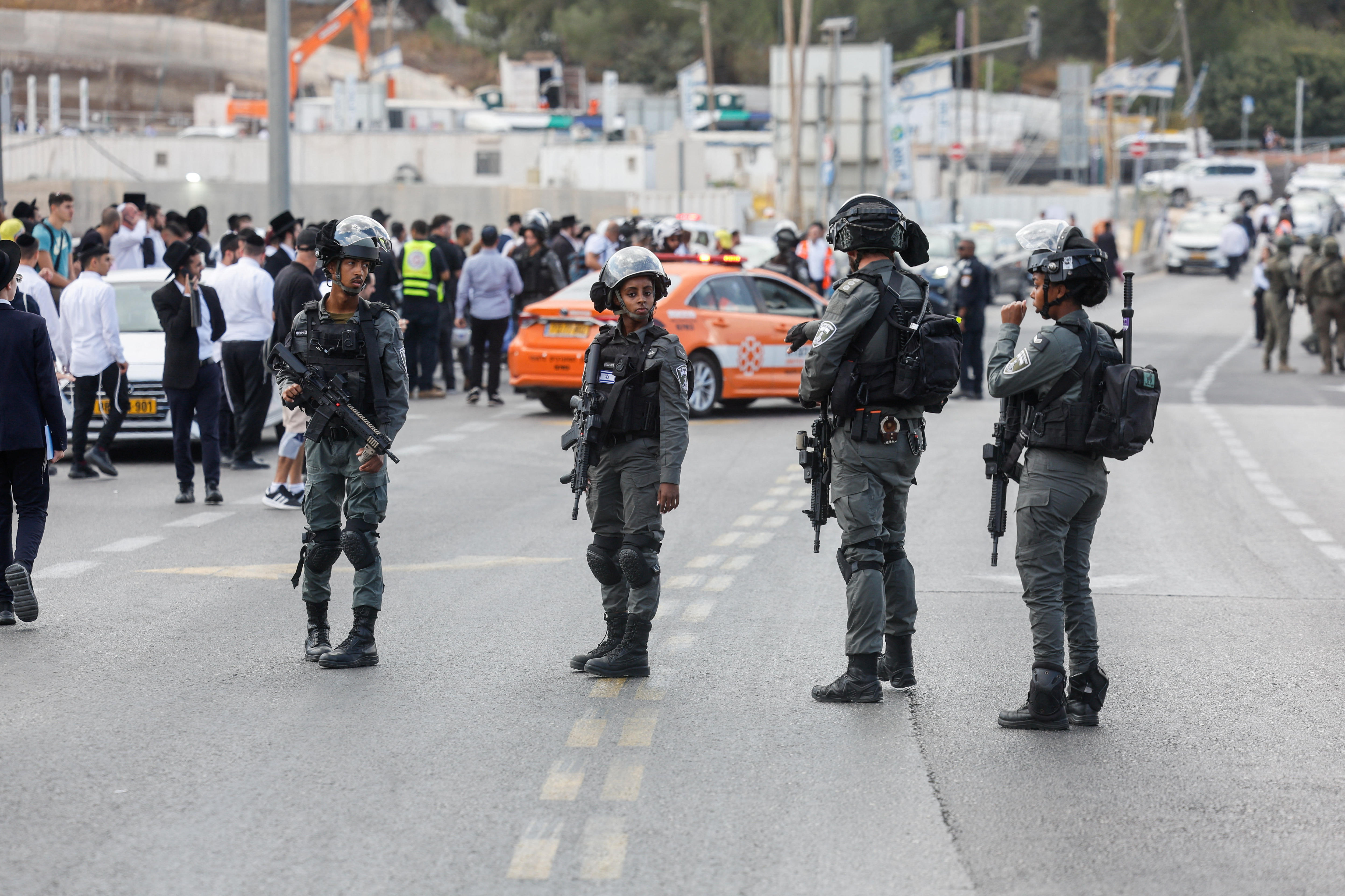 At least six dead, 15 wounded by gunmen at bus stop in Jerusalem ...