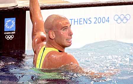 Hackett wins swimming's marathon - ABC News