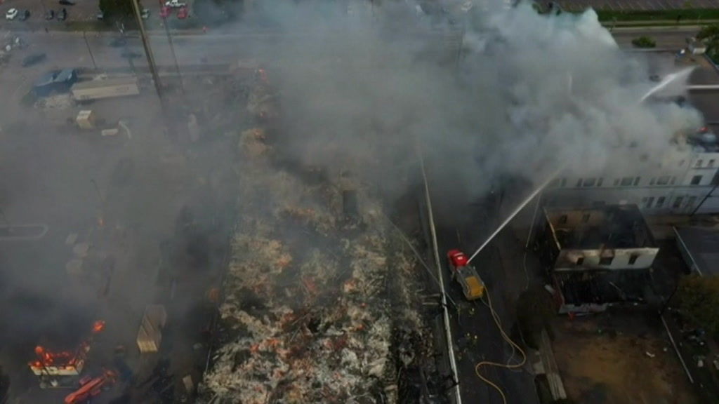 Fires smoulder in Minneapolis after a second night of protests - ABC News