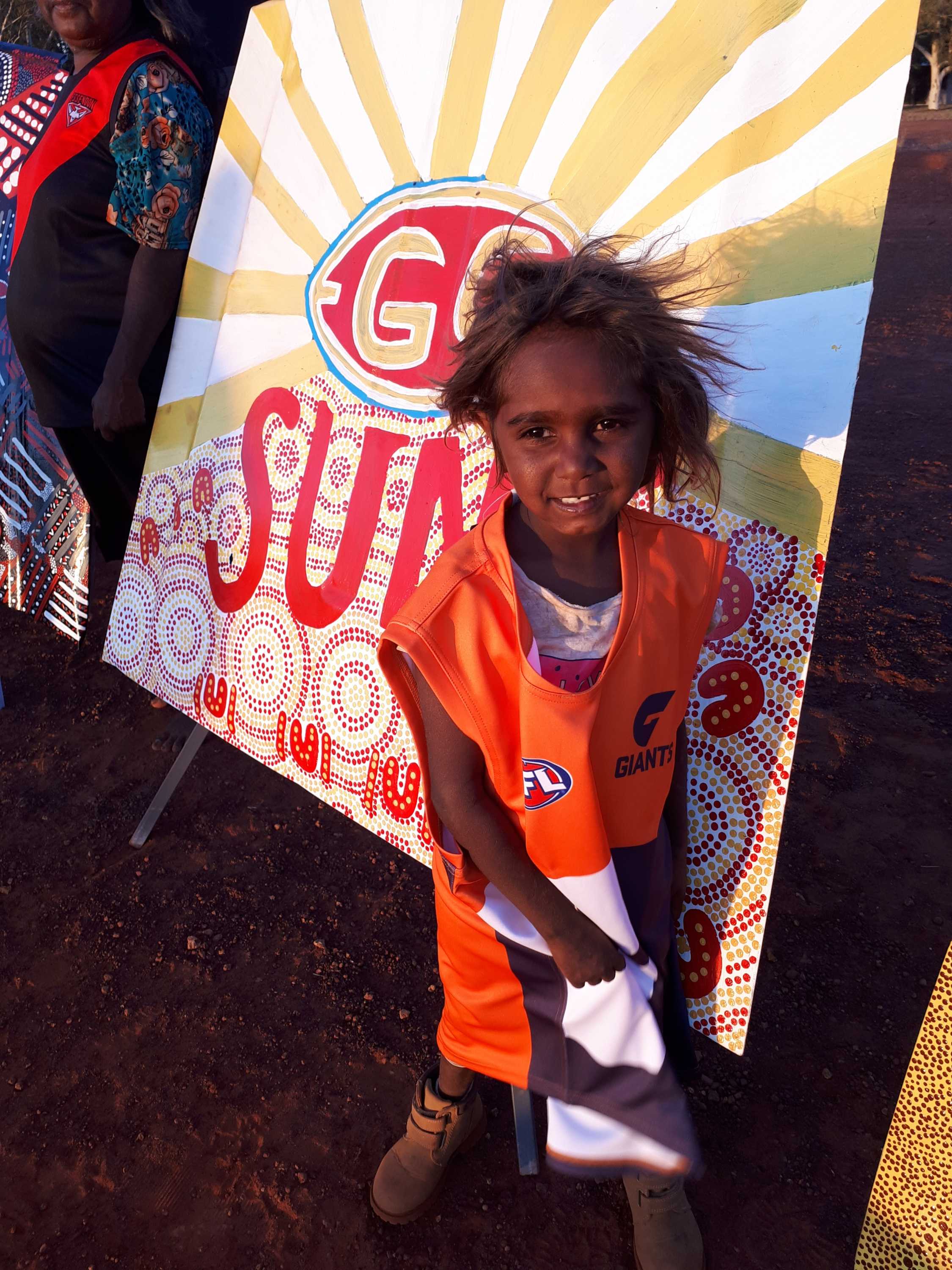 Balgo's remote artists hope footy-themed bonnet art can transform ...