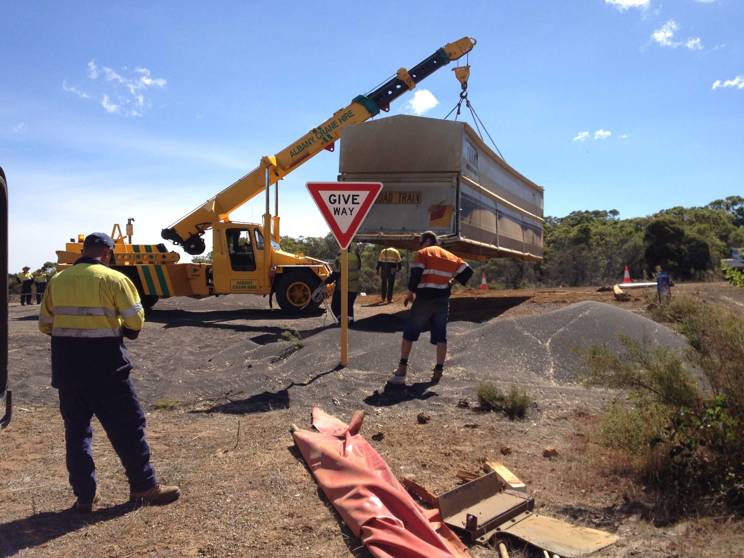 Overturned truck trailer spills GM canola - ABC News