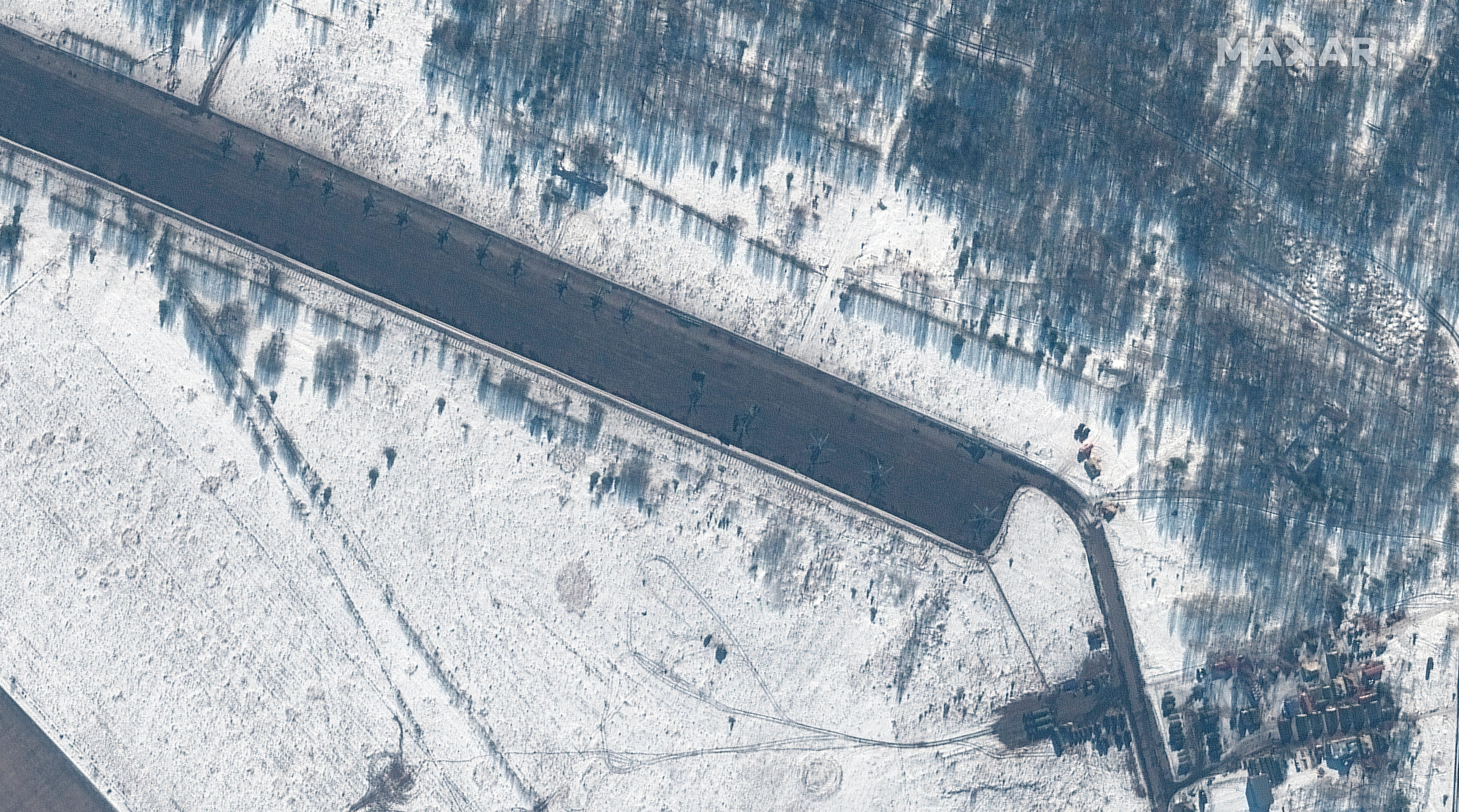 These satellite images show Russia has Ukraine surrounded - ABC News