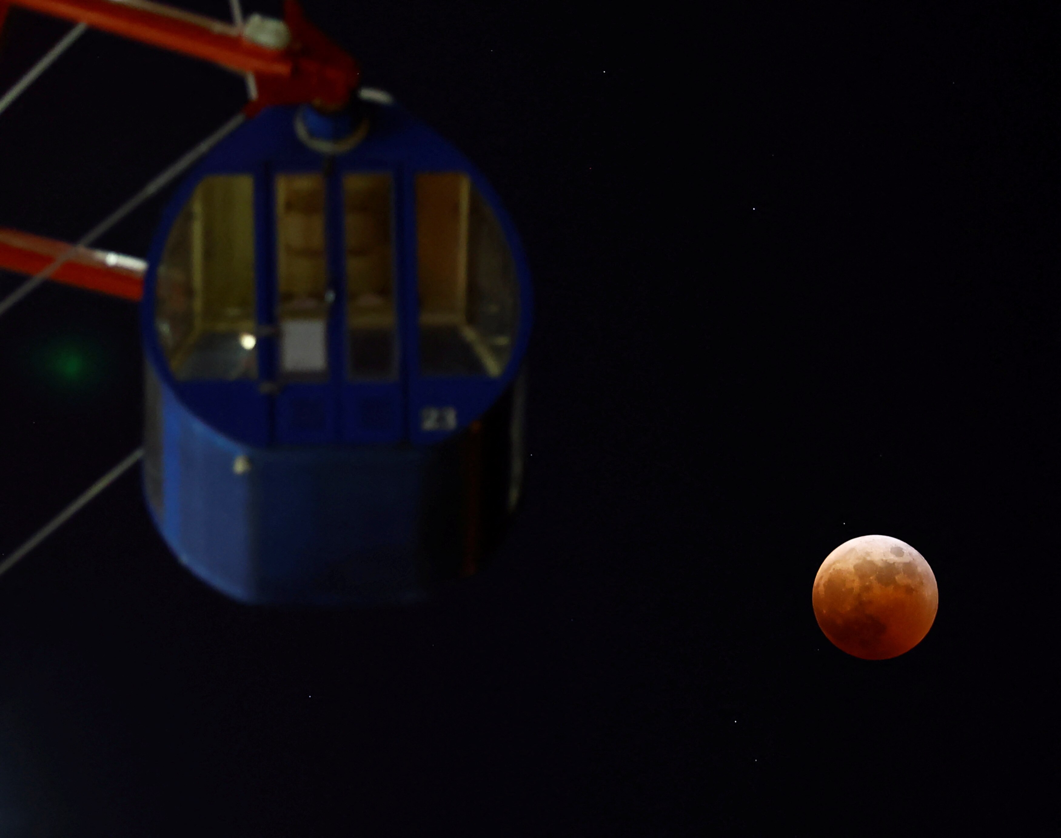 Lunar eclipse: Photos of Tuesday night's 'blood moon' from across the ...