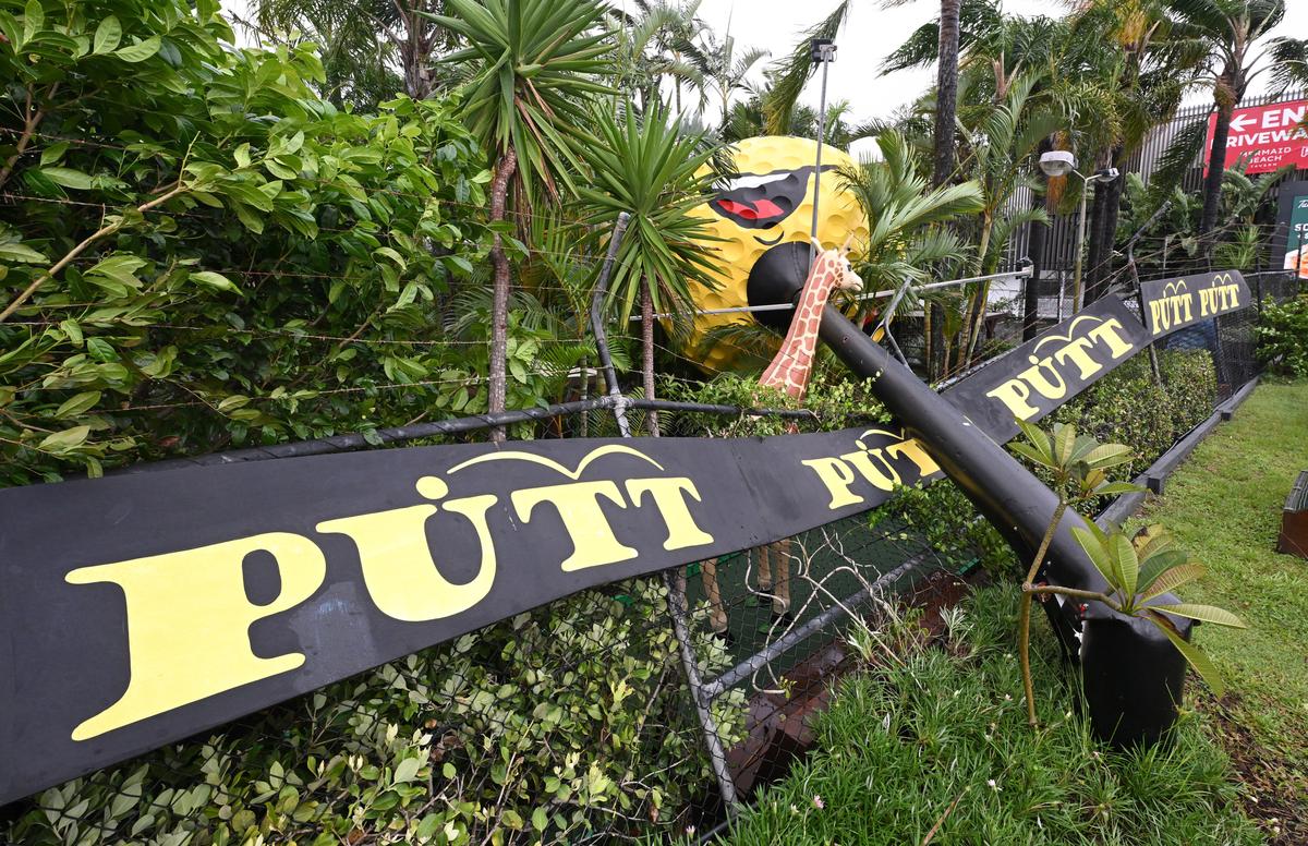 Giant putt putt sign falls during damaging winds - ABC News