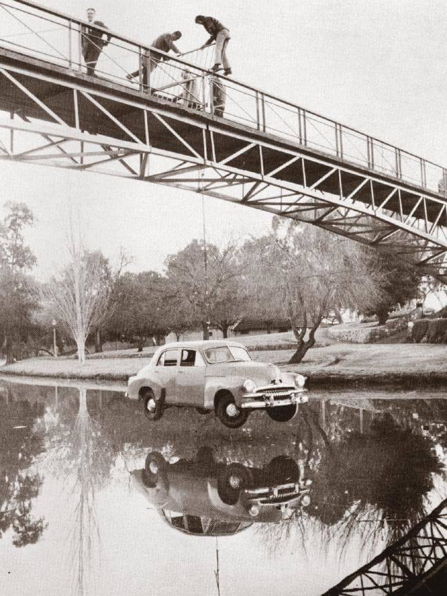 Adelaide Uni students hang FJ Holden from footbridge in 1971 - ABC listen