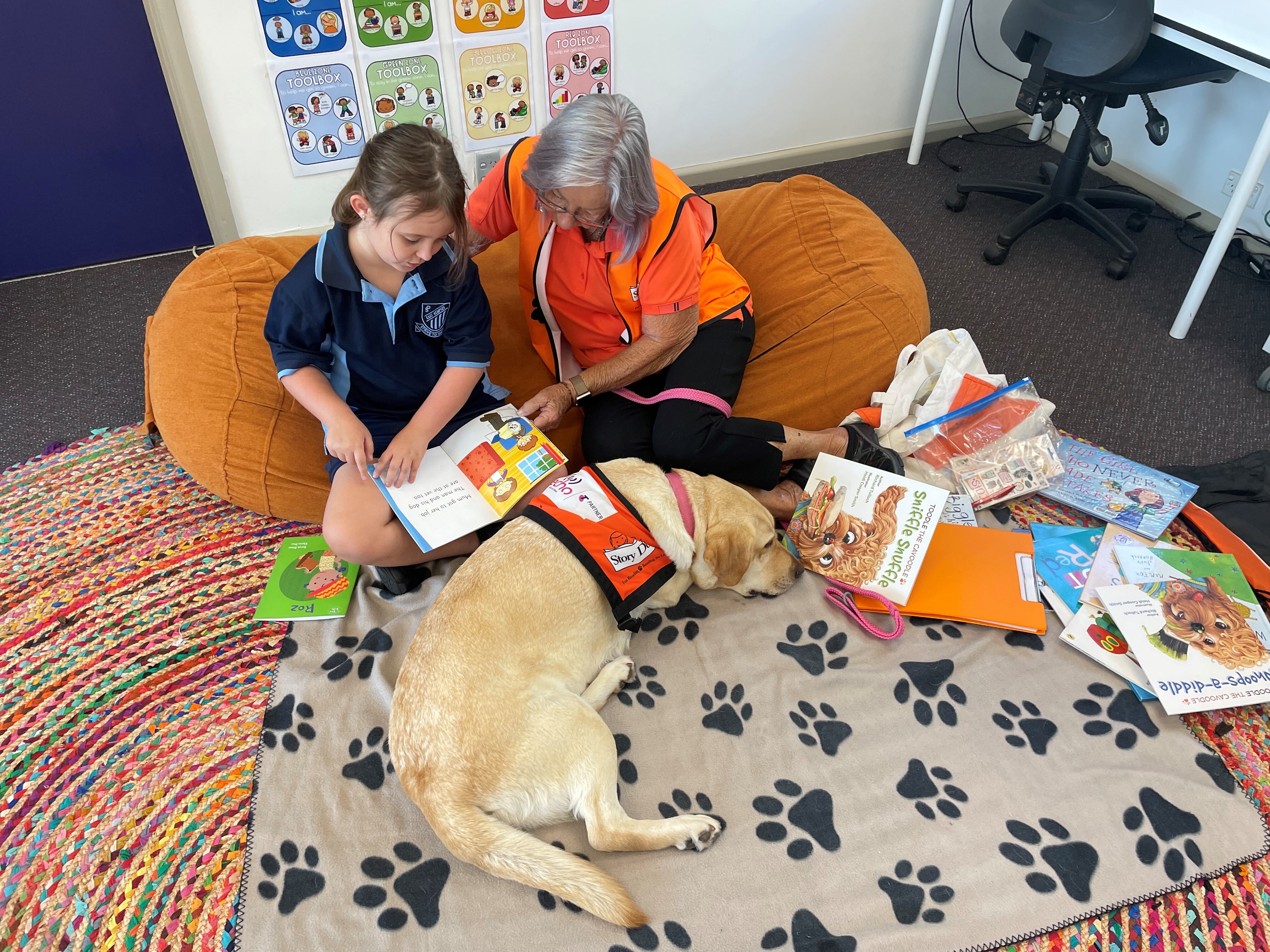 Story Dogs reading program provides positive, calm…
