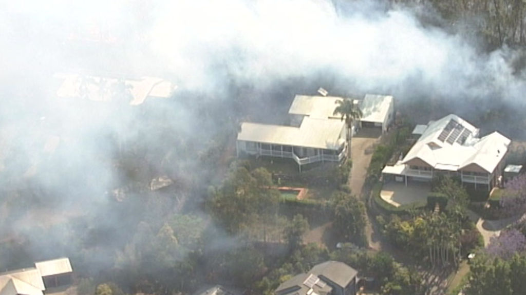 Queensland fires force thousands of residents to evacuate near ...
