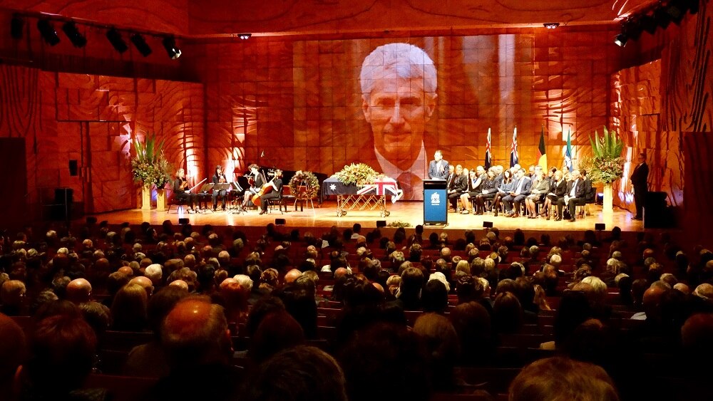 Anthony Foster's funeral celebrates his 'grace' and legacy in fight ...