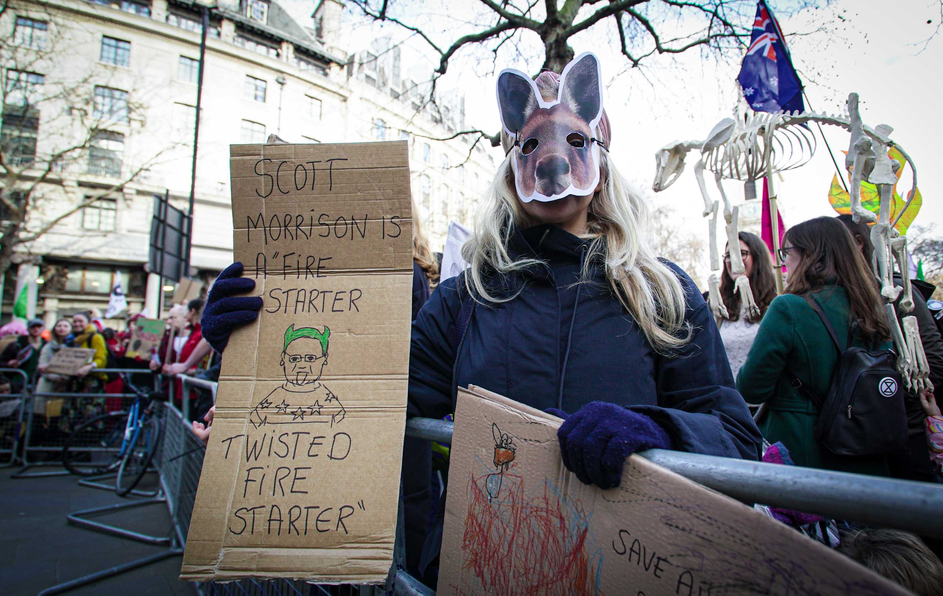 Climate action protesters angry over Australia's bushfires rally across ...