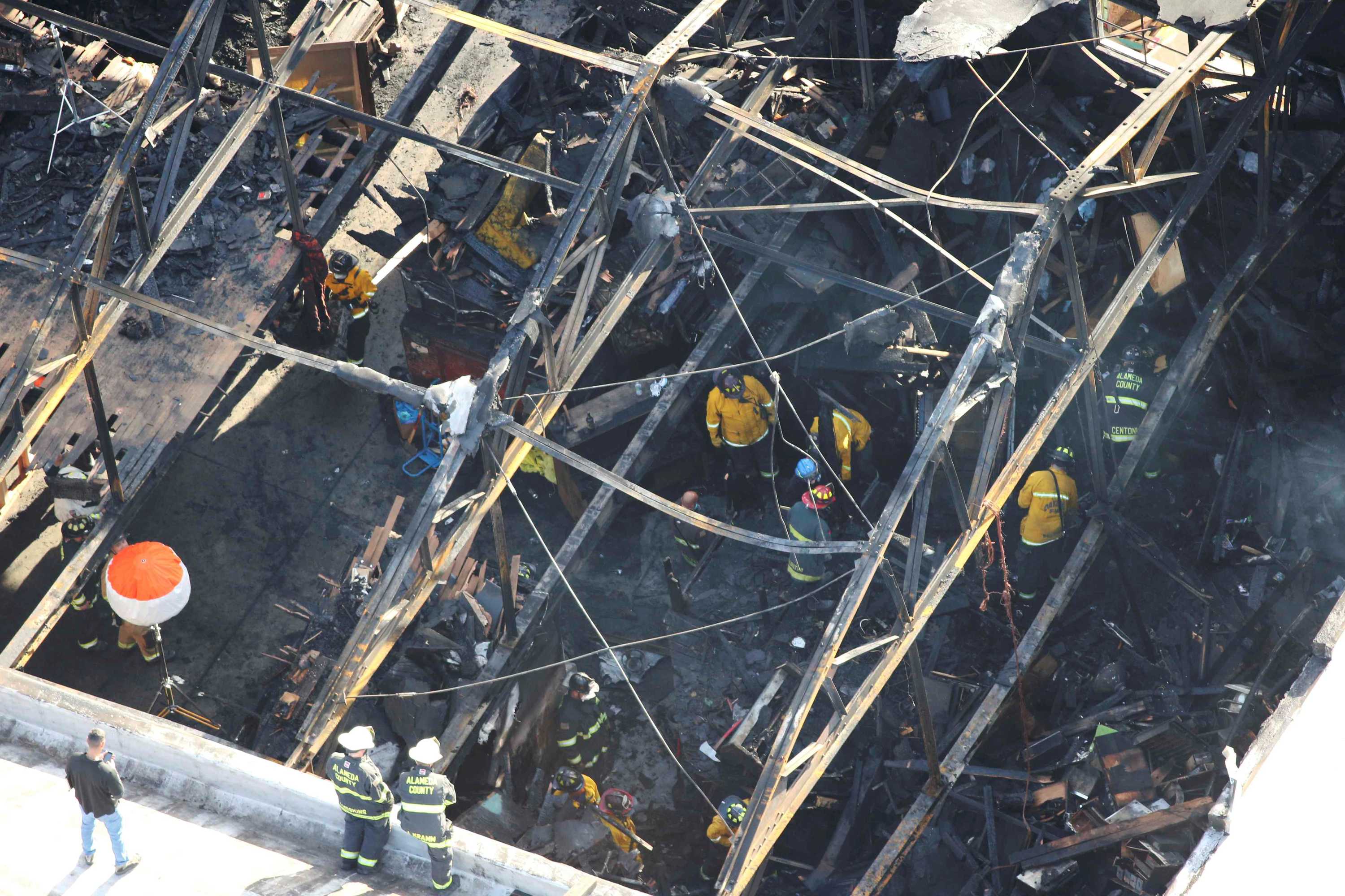 Warehouse party fire: Authorities launch criminal probe as death toll ...