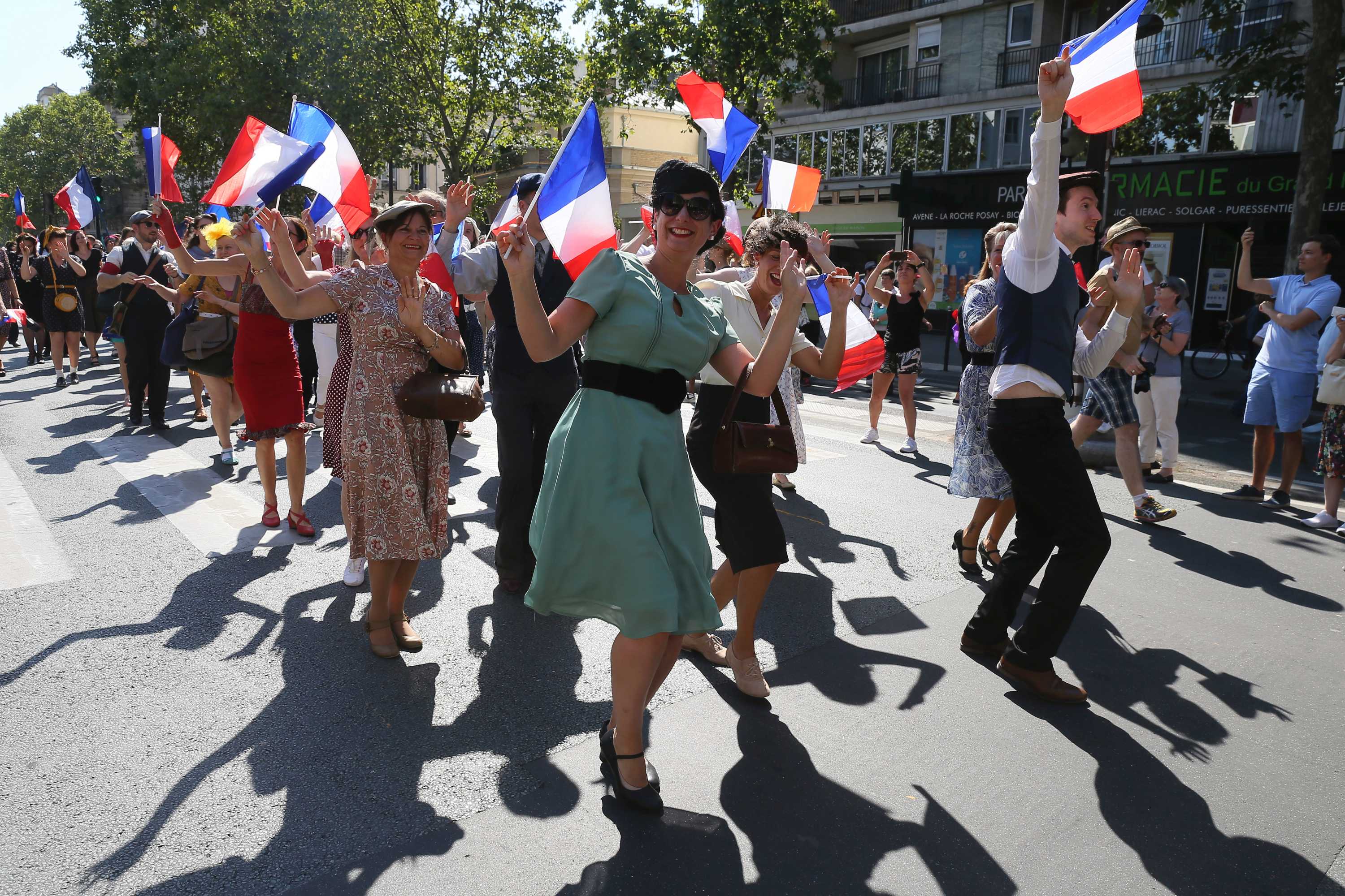 Paris celebrates French Resistance role in liberation from Nazi ...