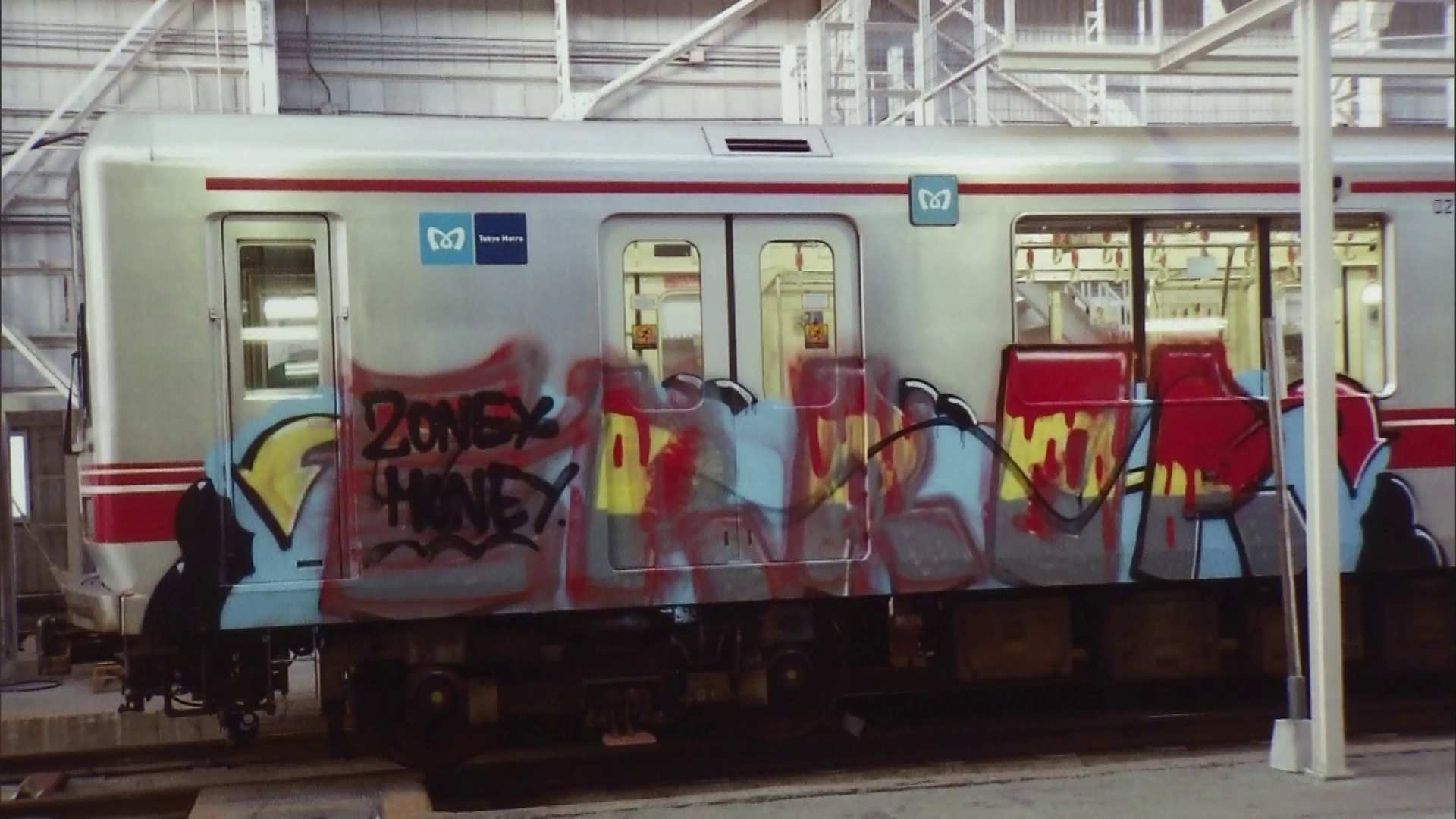 Australian arrested in Japan over alleged subway train graffiti attack ...