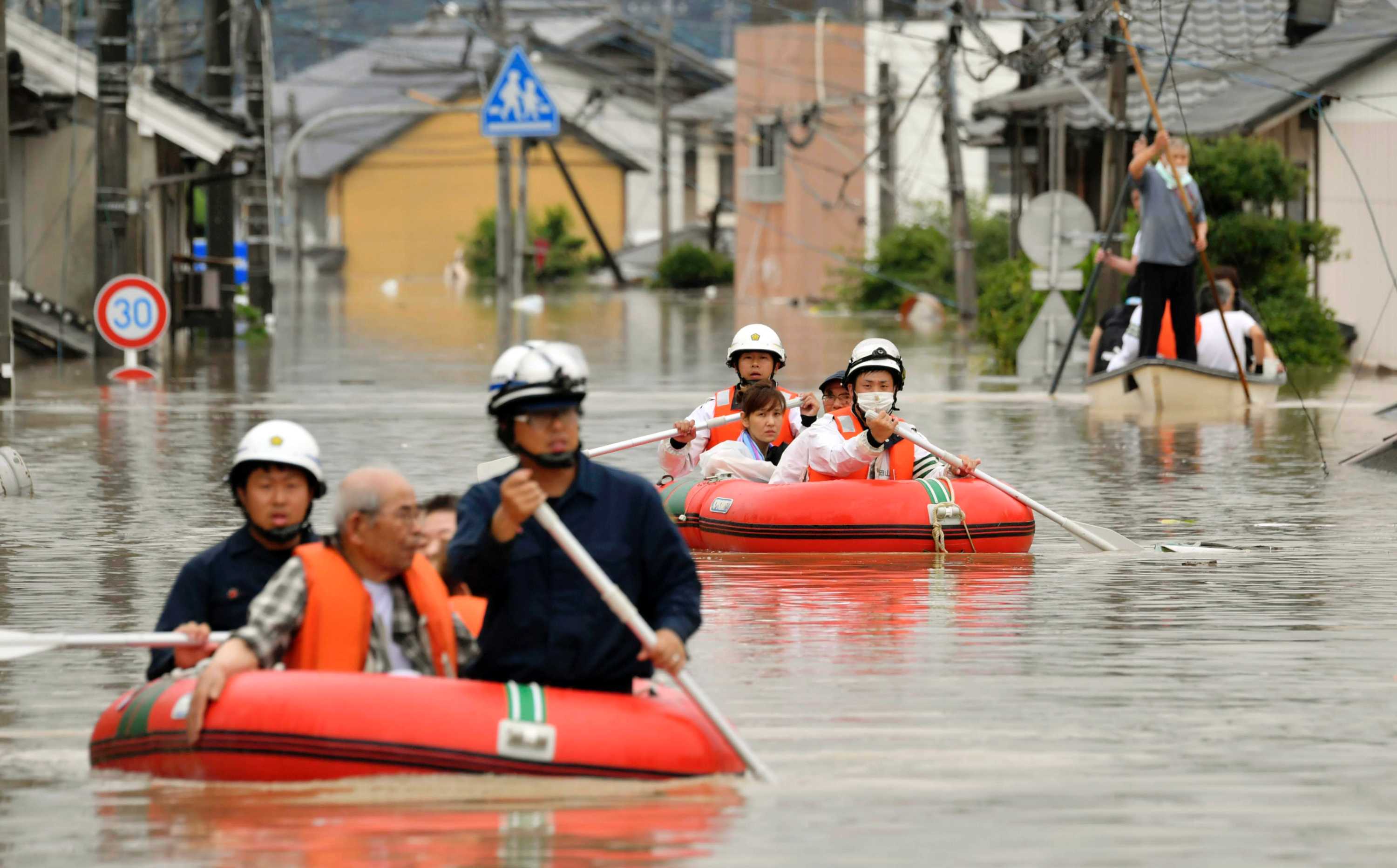 Japan flooding and landslides kill dozens as millions are ordered to ...
