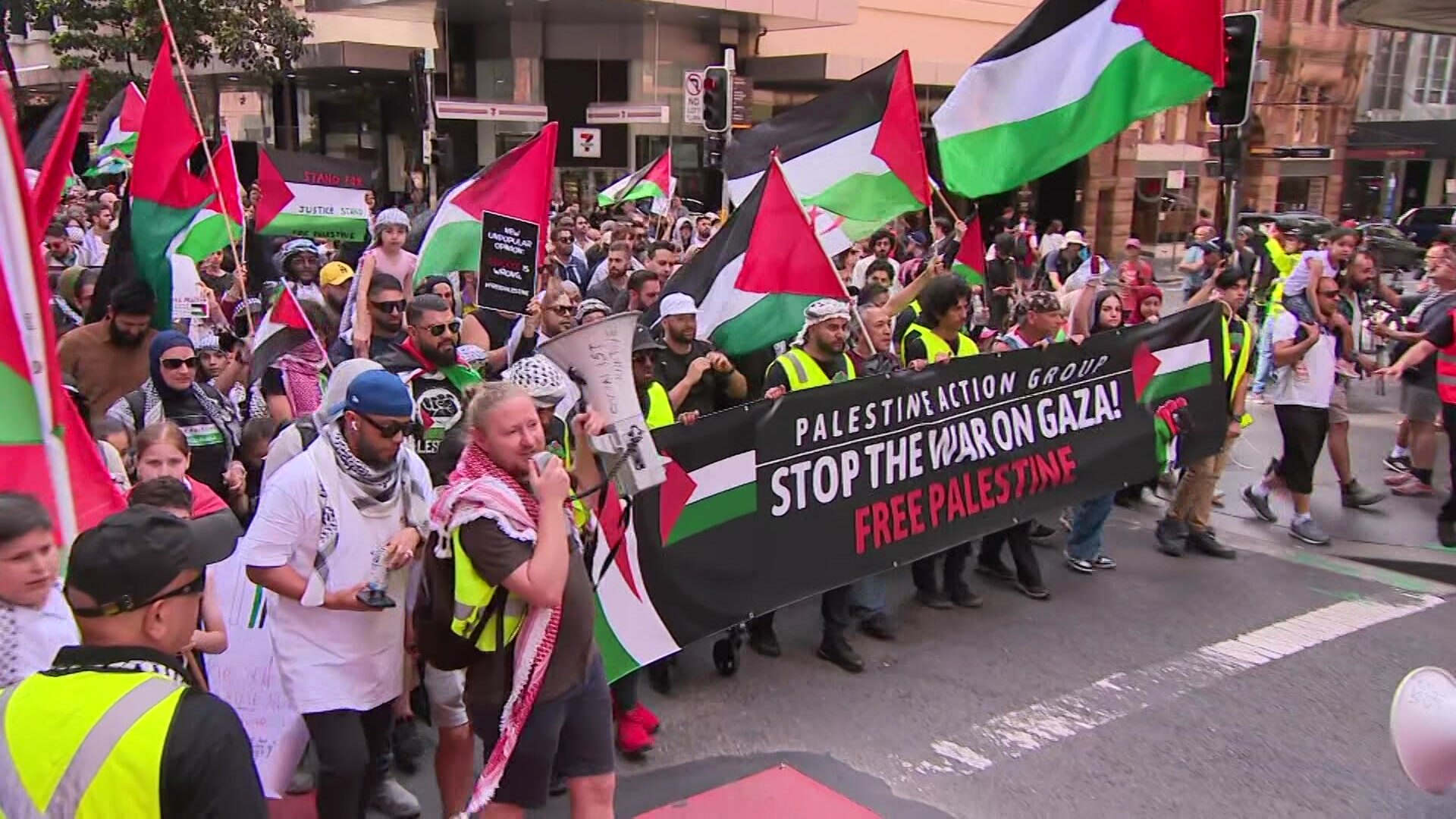 Colours of Palestinian flag fly over streets in Sydney, Brisbane and ...
