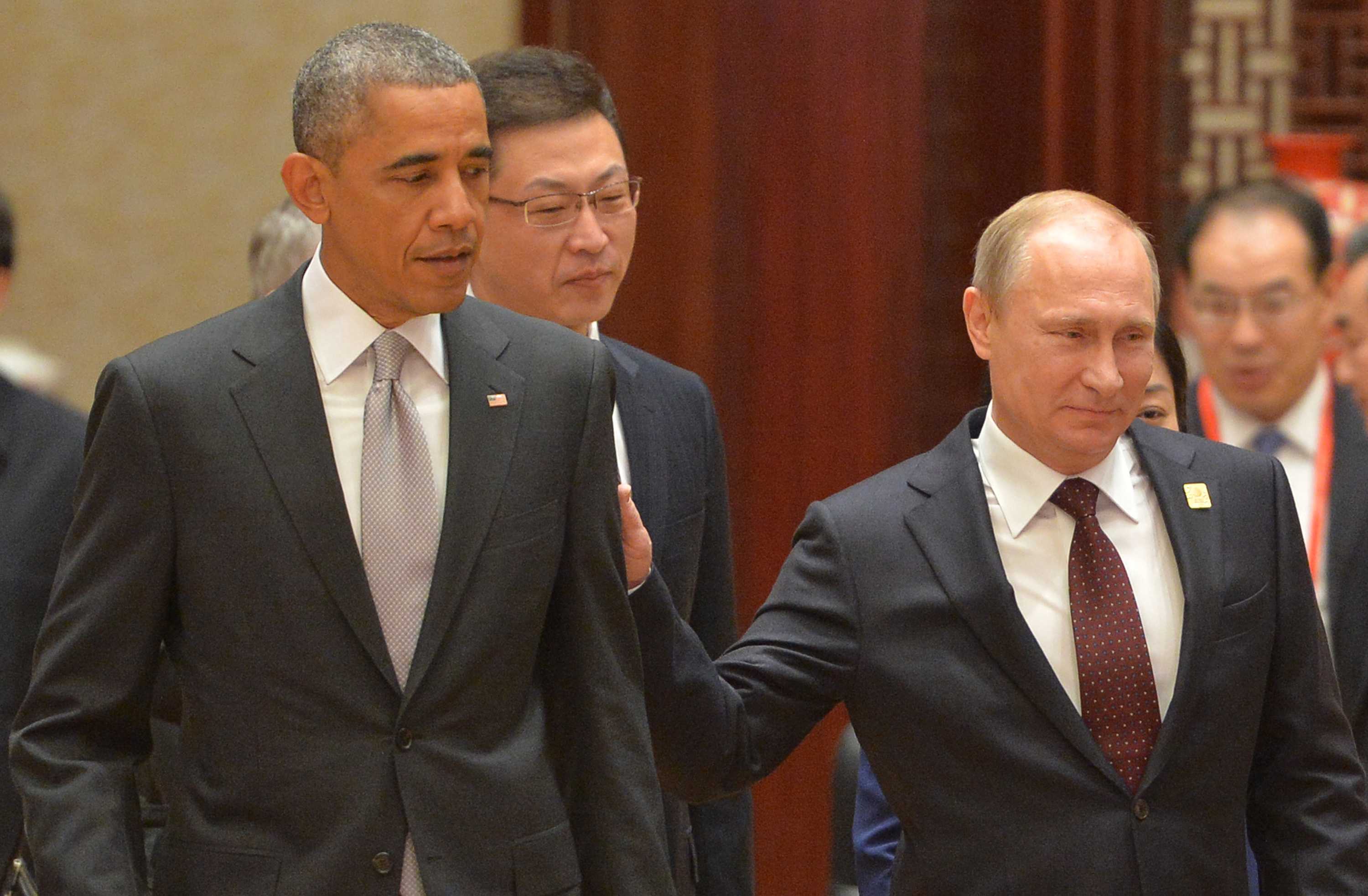 APEC: Barack Obama and Vladimir Putin hold three short meetings on ...
