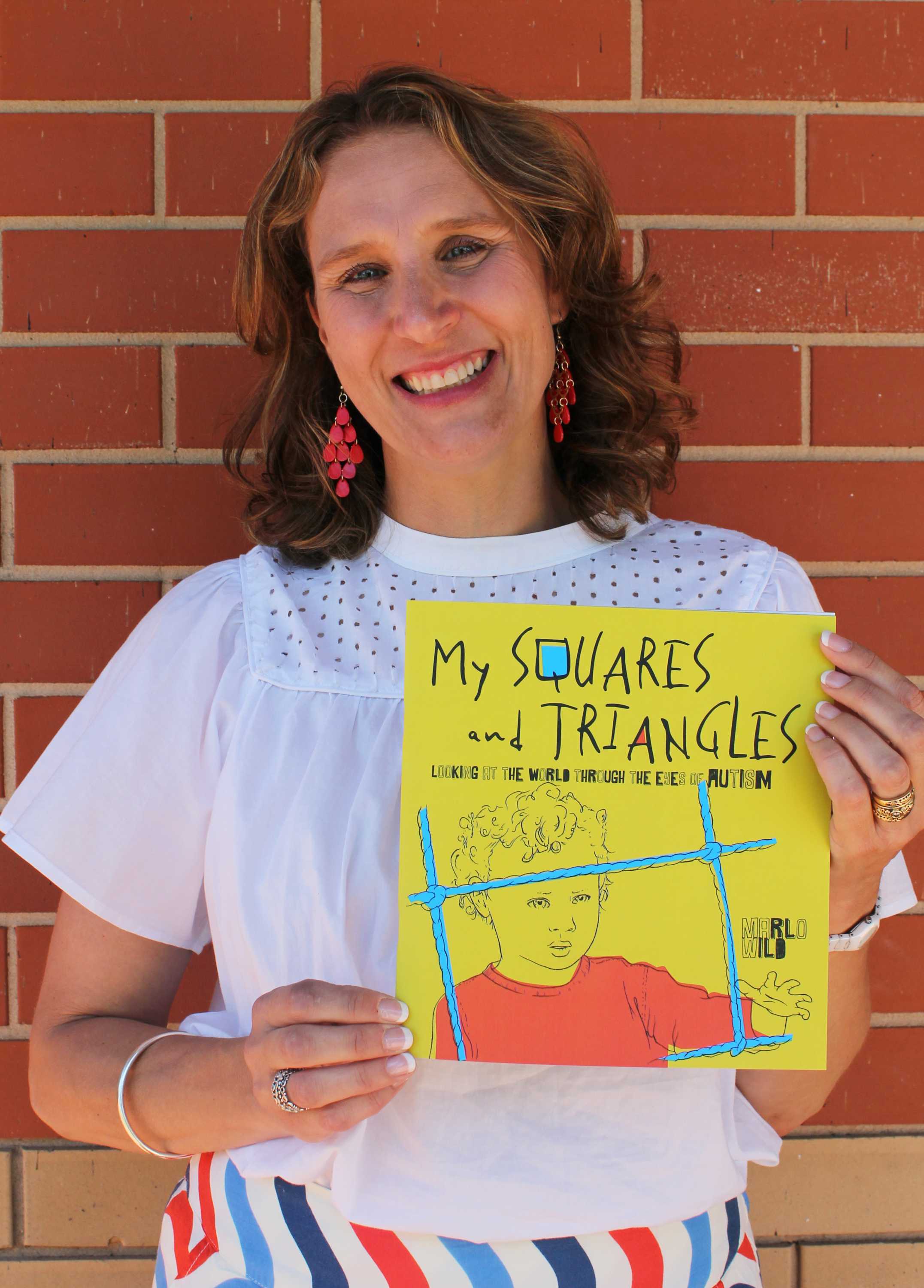 Children's author writes book from perspective of autistic son - ABC News