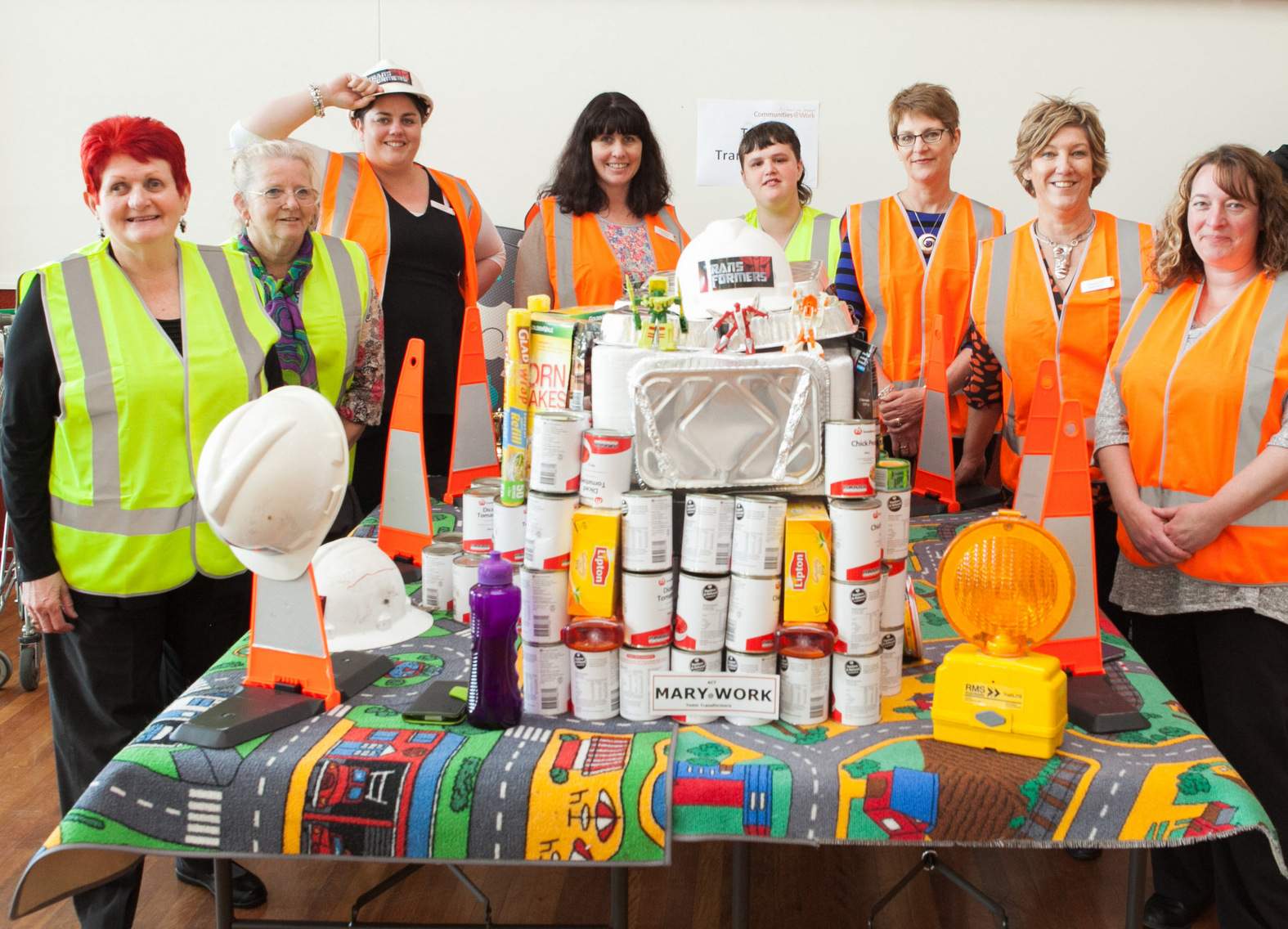 Communities@Work: Stacking cans creatively ensures charity puts food on ...