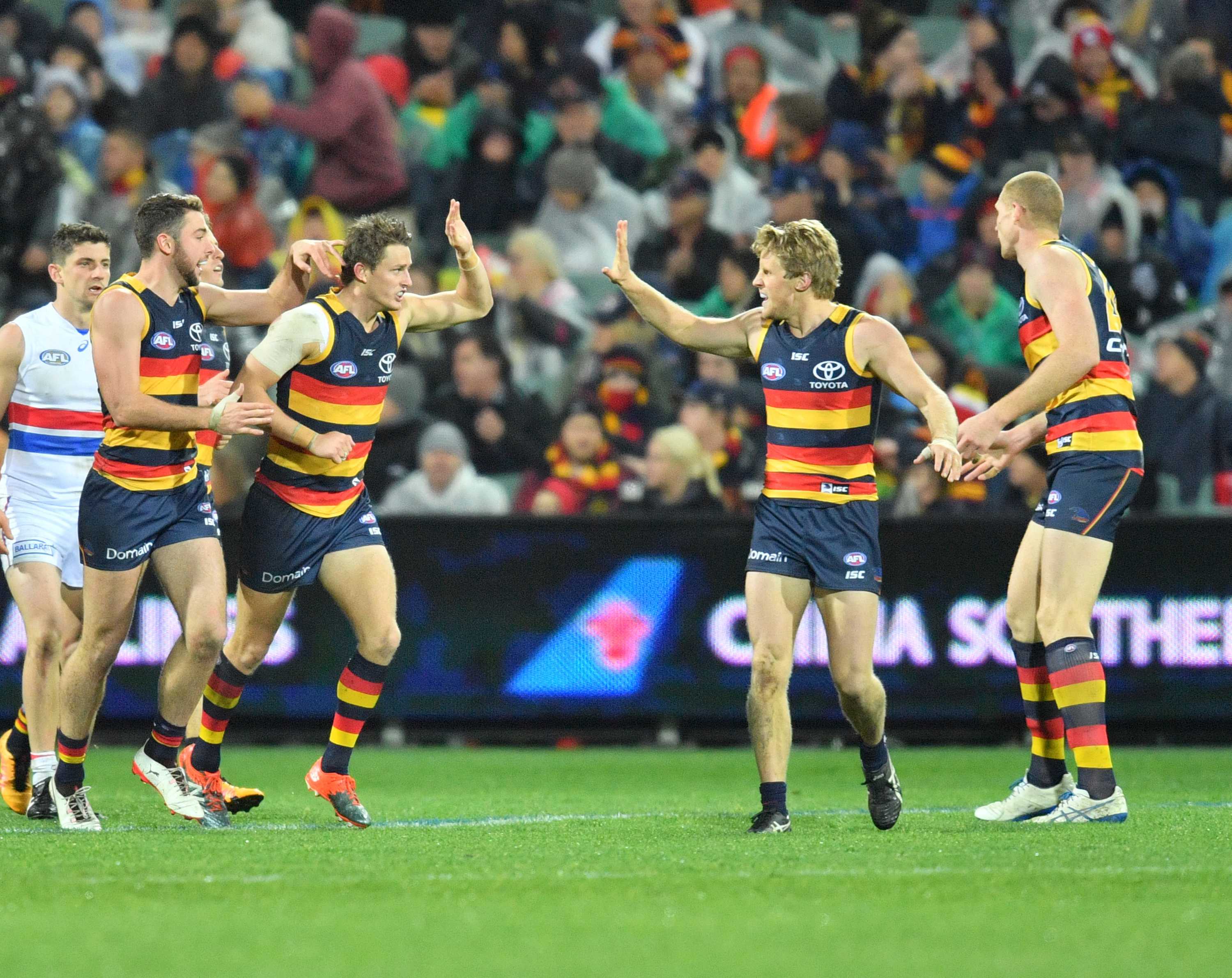 Adelaide Crows rack up 59-point win over Western Bulldogs in the wet at ...